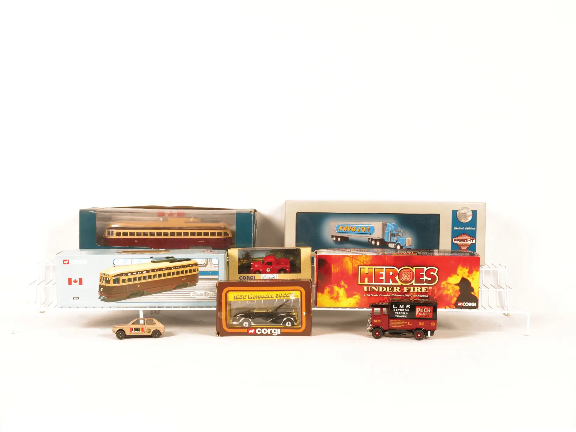Eight Die-Cast Models by Corgi | Auburn Memorabilia Auction | RM Sotheby's