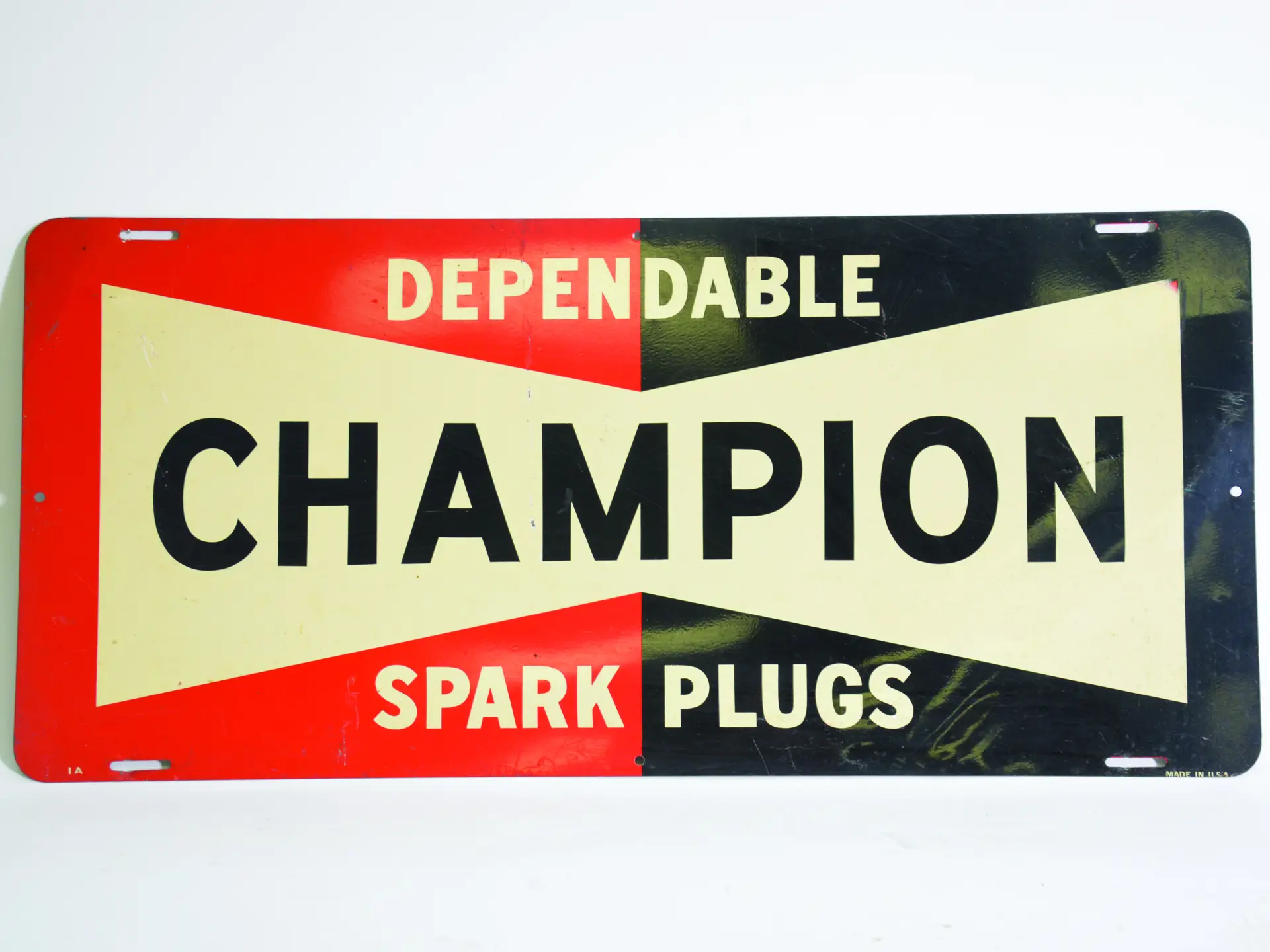 A single-sided, tin painted ‘Champion spark plug’ sign, 26" x 12 ...