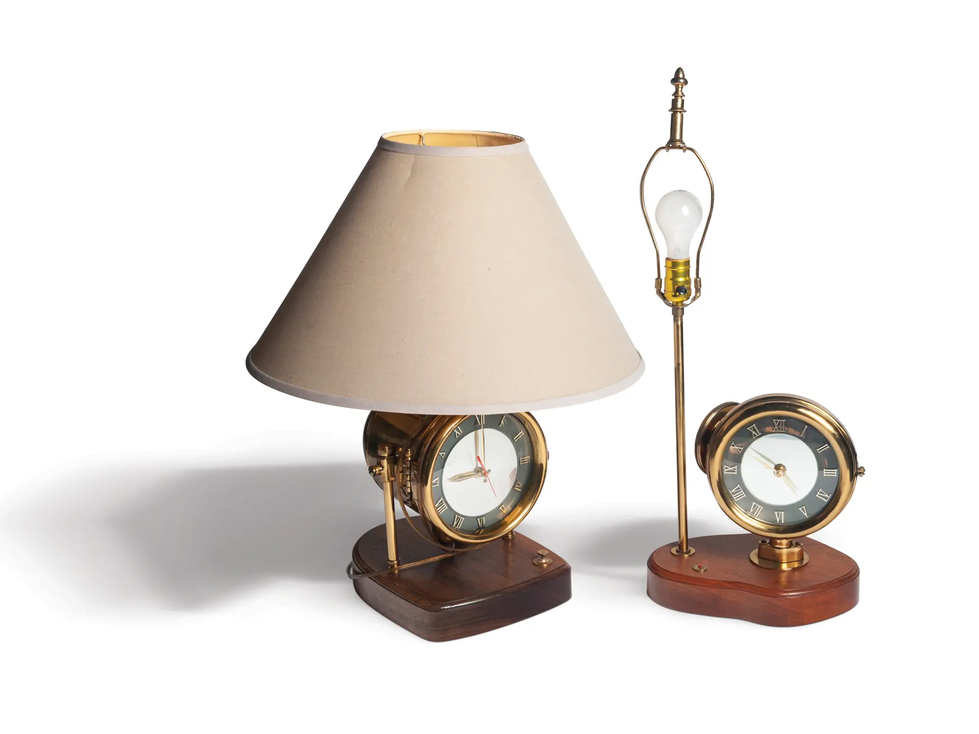 Pair of Brass Clock Taple Lamps | The Guyton Collection | RM Sotheby's