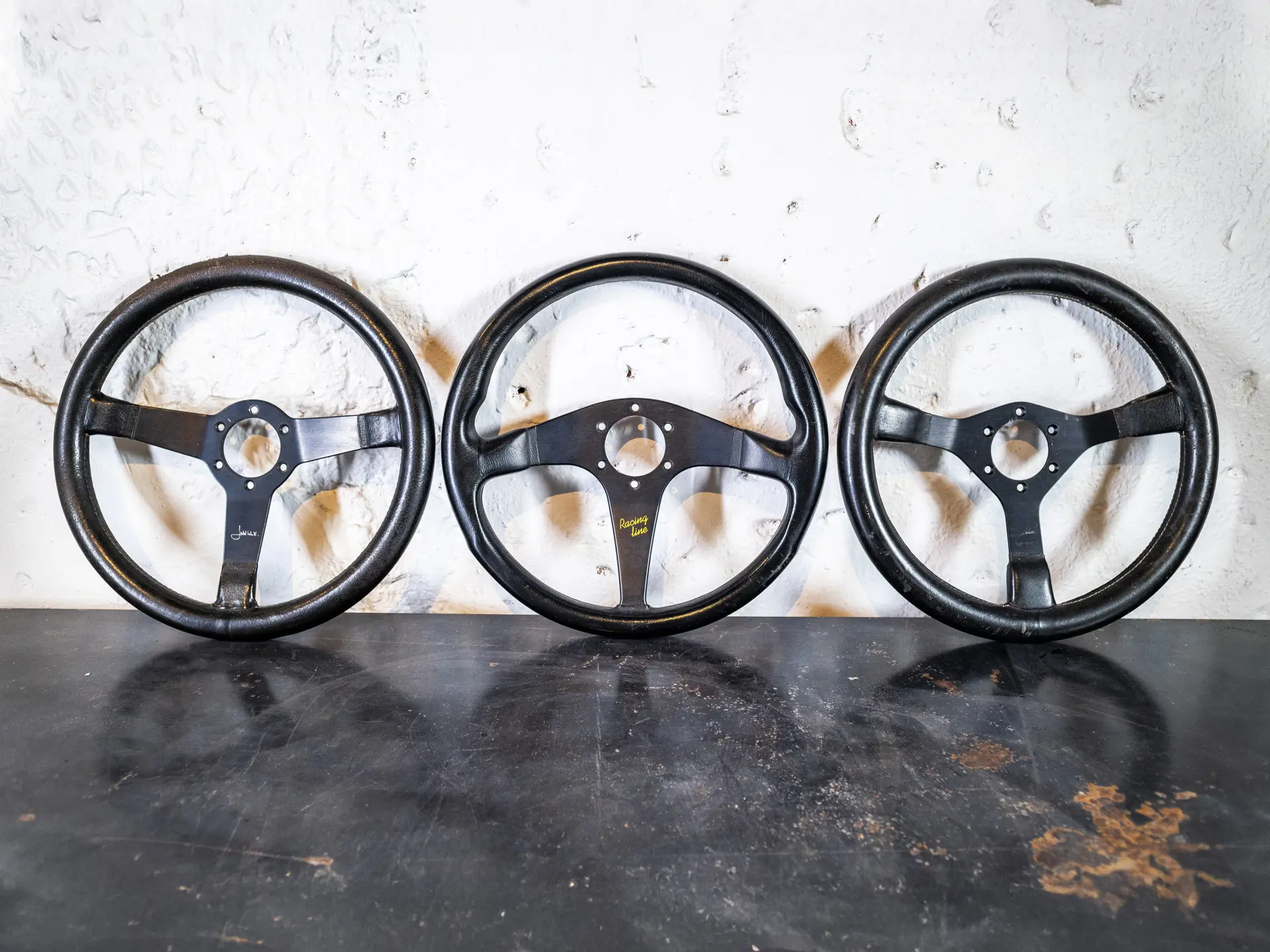 Three MOMO Signature Line Leather-Wrapped Steering Wheels for Porsche ...