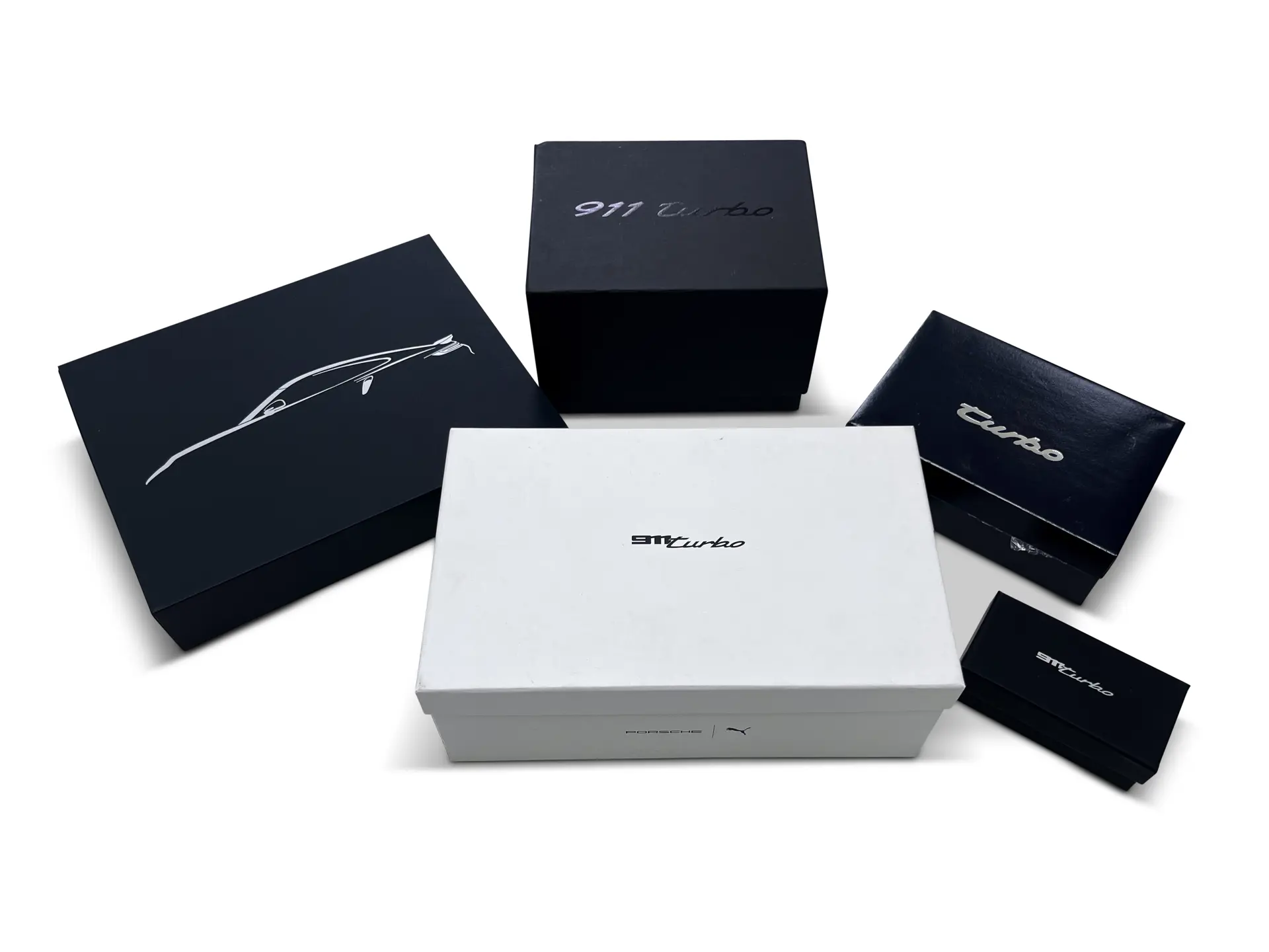 Porsche 911 Turbo Emblems, Models, Sculptures, and Shoes | The White ...