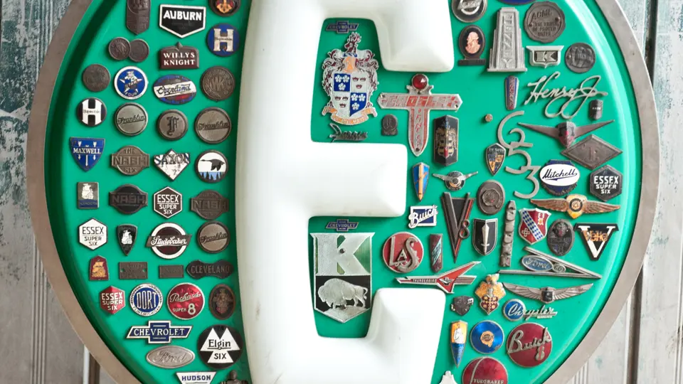 Various Makes of Radiator Emblems Mounted on Edsel Sign | The Lee Roy ...