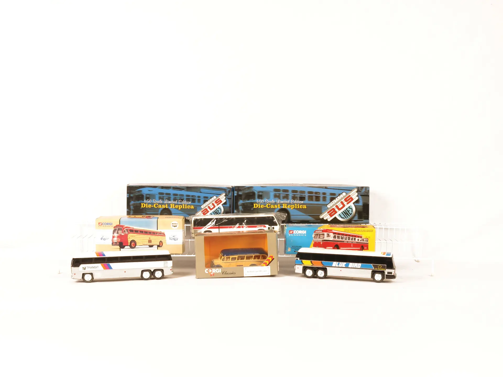 Five Public Transportation Buses by Corgi and Three Plastic Bus Banks ...