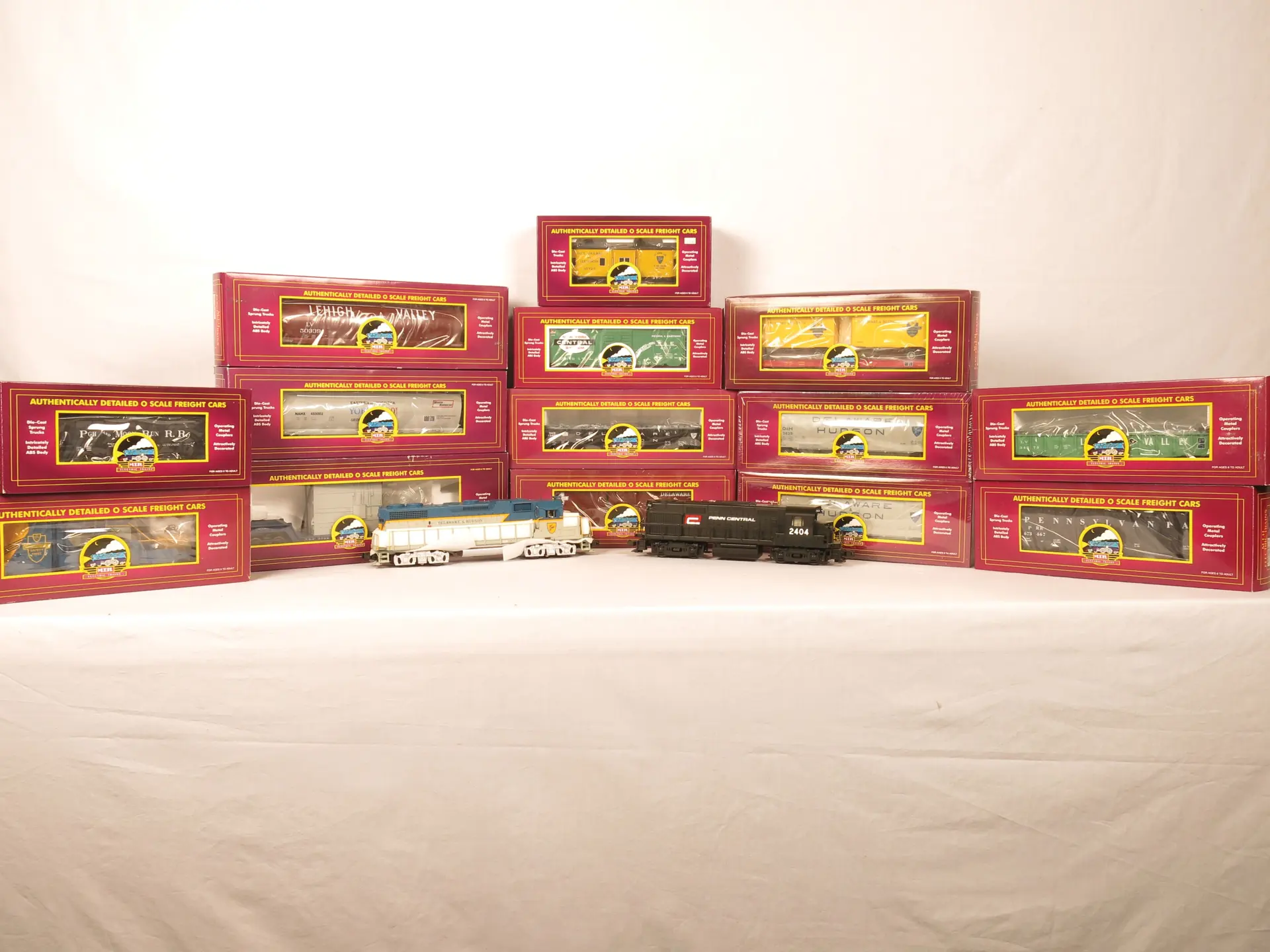 Two MTH O Gauge Diesel Engines with Thirteen Rolling Stock Cars and ...