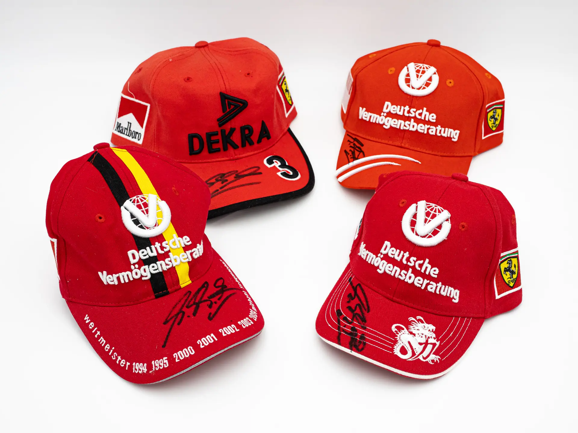 Four Assorted Michael Schumacher Formula 1 Signed Caps | The Champions ...