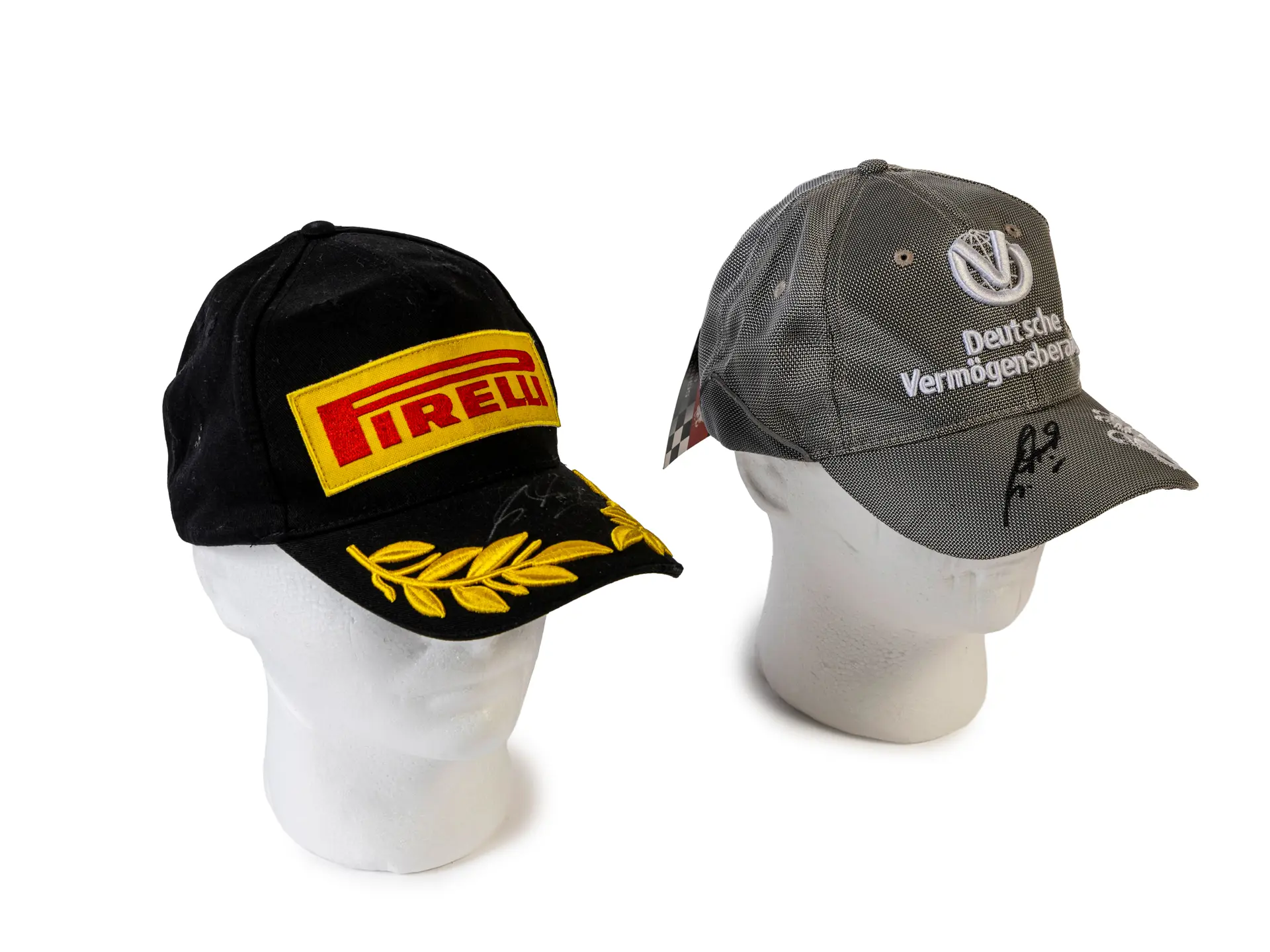 Michael Schumacher Signed Mercedes and Pirelli Formula 1 Caps | The ...