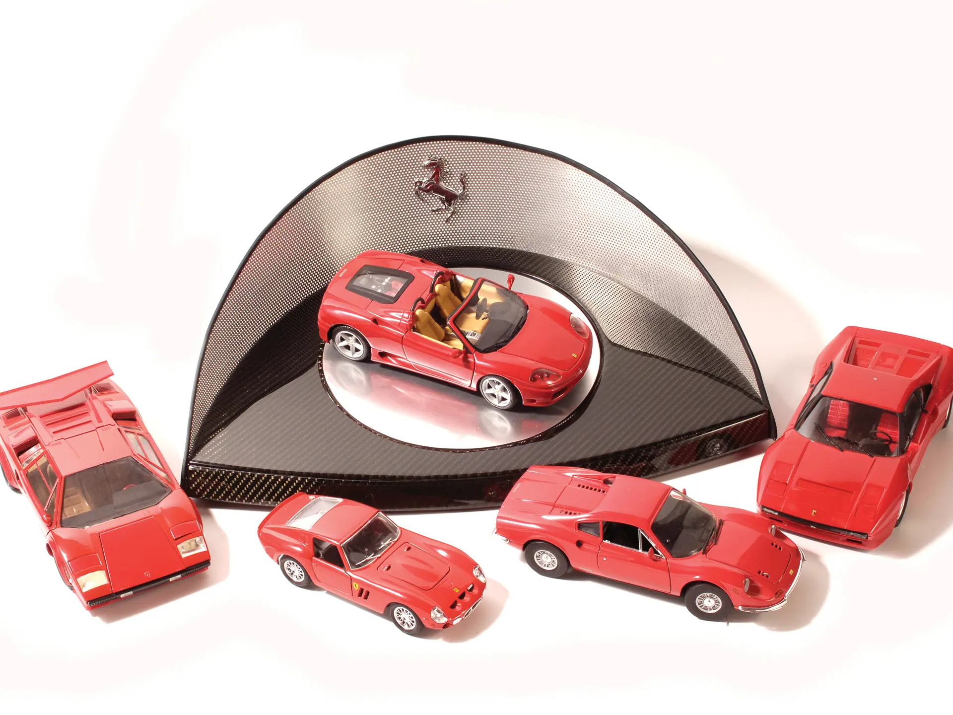 MODEL CARS AND DISPLAY STAND | The Ponder Collection | RM Sotheby's