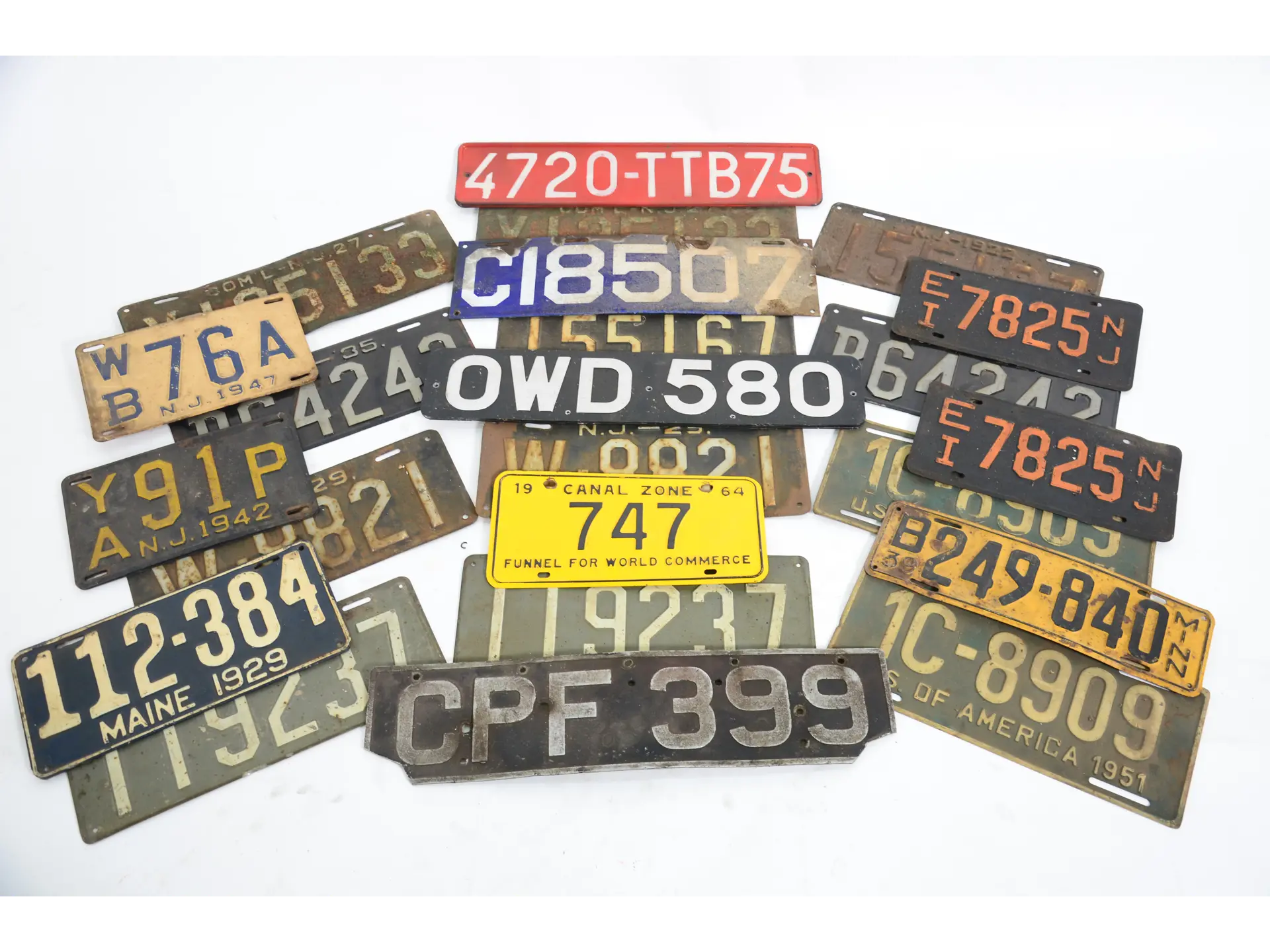 A comprised lot of assorted license plates mostly matched sets and some ...