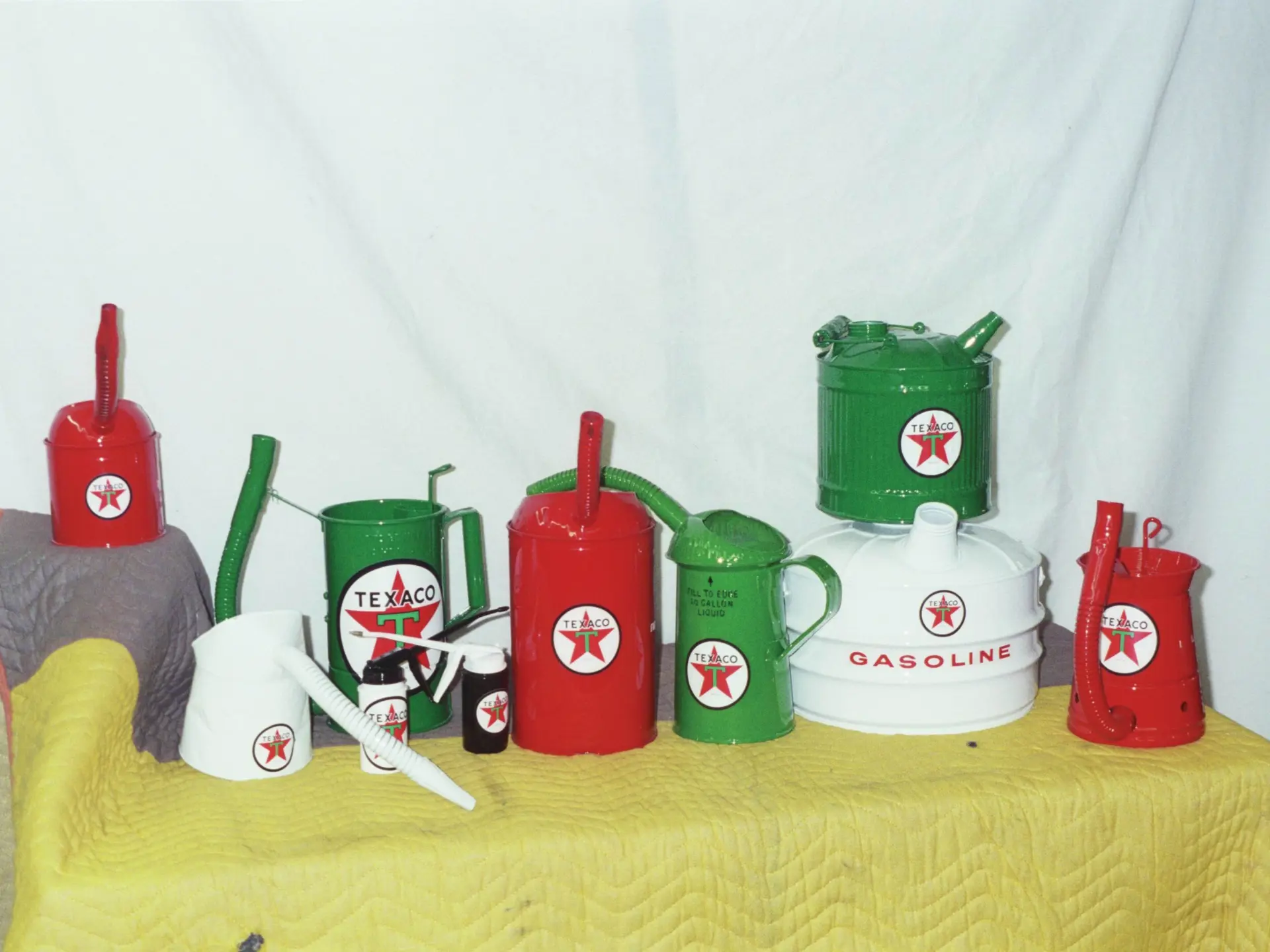 Complete job lot of 1950's restored oil containers and gas cans. (10 ...