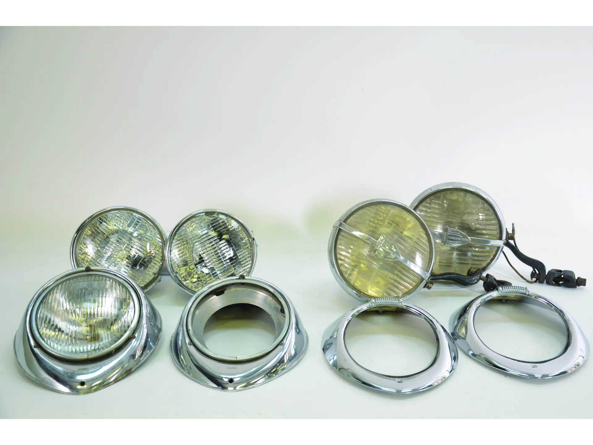 A lot of various headlamps bezels | Auburn Fall 2016 | RM Sotheby's