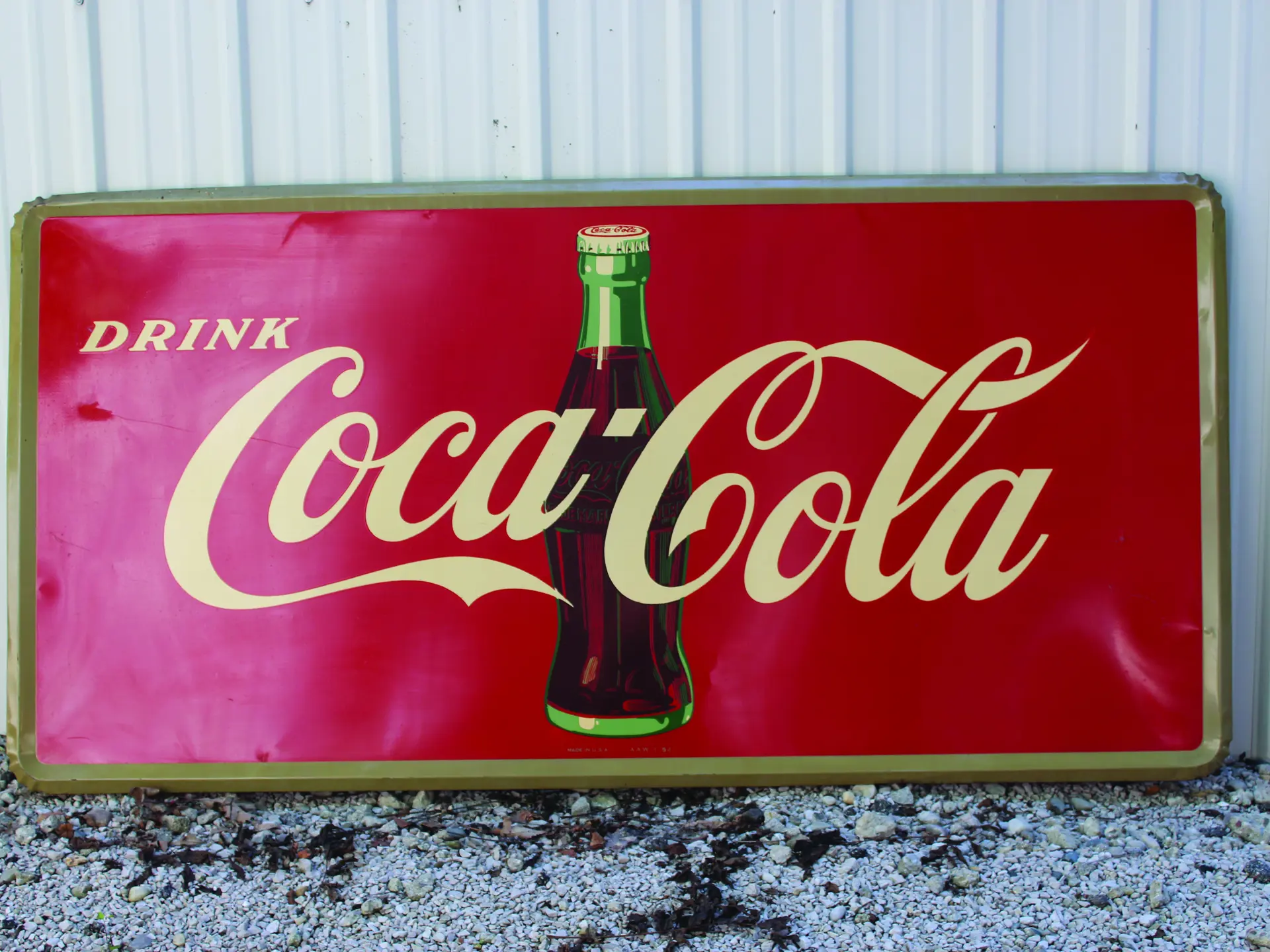 A large, Coca-Cola sign. | Auburn Fall 2017 | RM Sotheby's