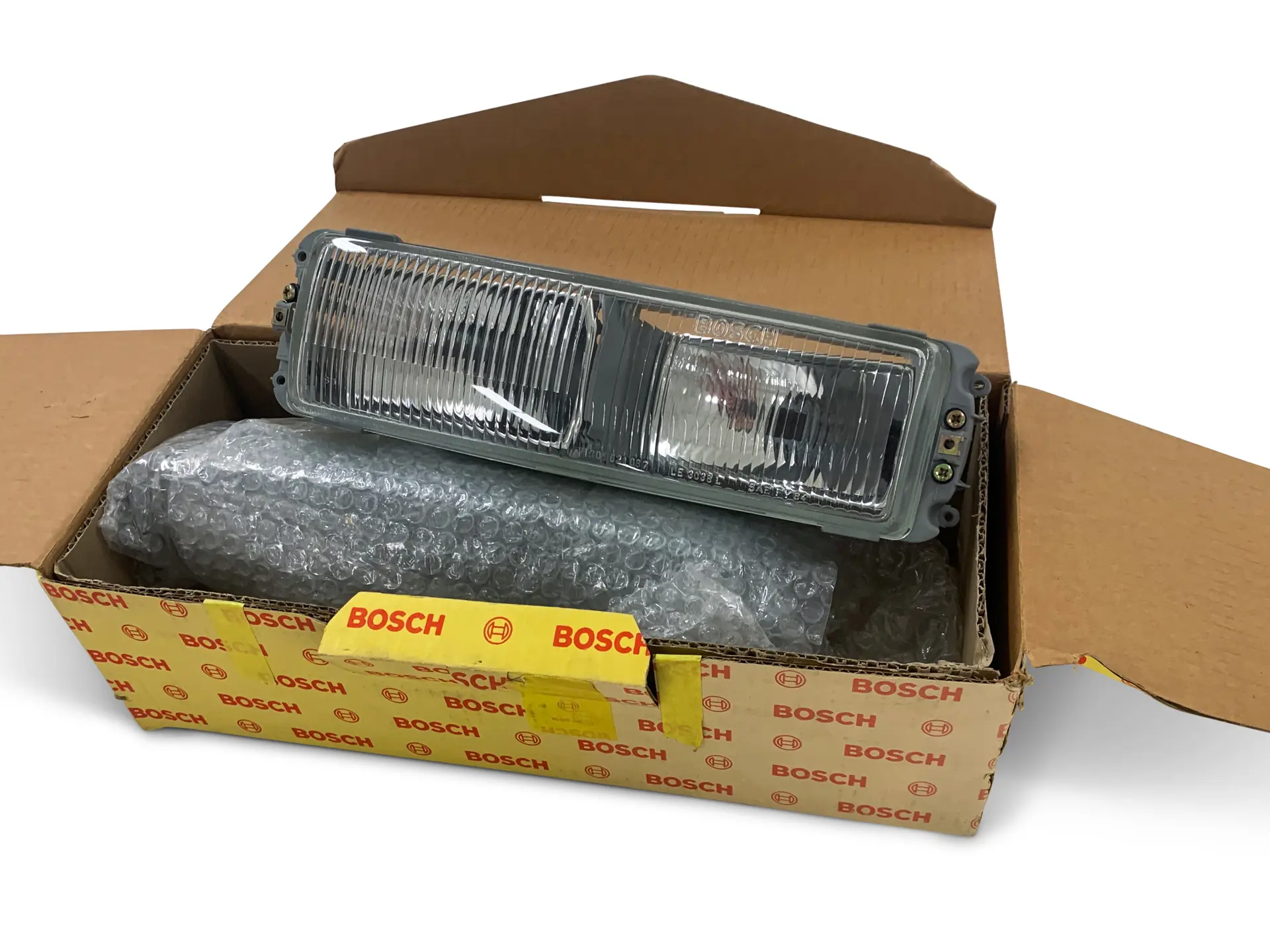 Two Bosch LE 3038 Headlights | The White Collection | Online | RM Sotheby's