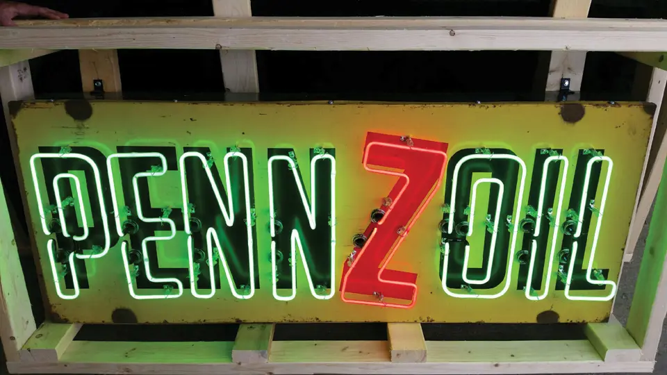 Original Firestone tin sign, 72x20in | Auburn Fall 2015 | RM Sotheby's