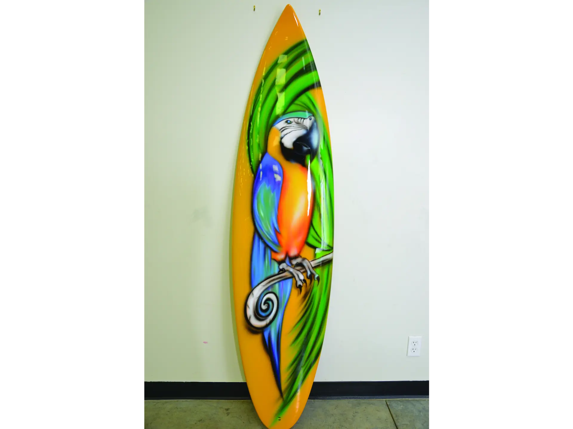 A custom painted Parrot surfboard. | Auburn Fall 2016 | RM Sotheby's