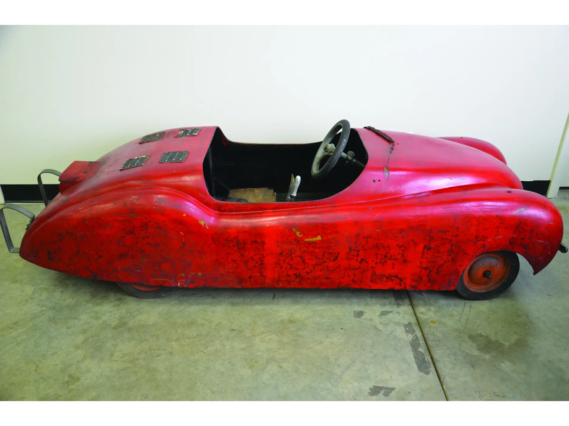 A 1930s style, red child's car | Auburn Fall 2016 | RM Sotheby's