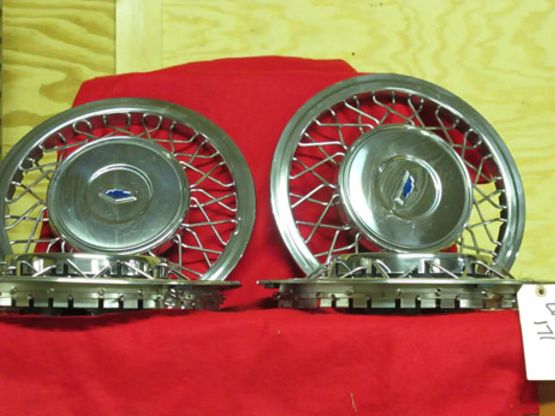 ’55 Chevrolet Wire-Spoke Hubcaps | The Milton Robson Collection | RM ...