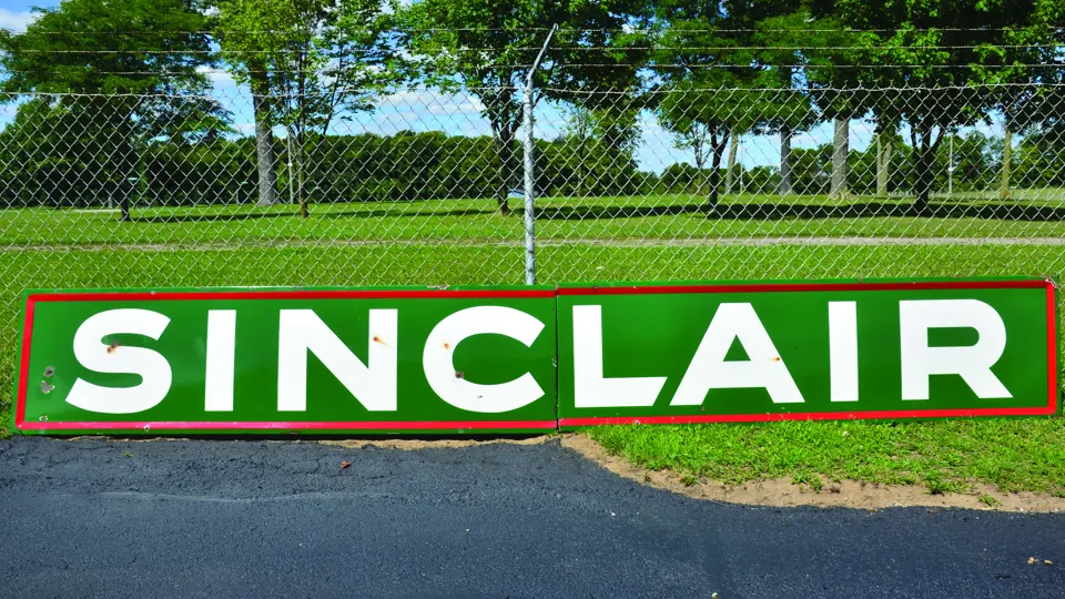 A large Sinclair porcelain service station sign dated 5-2-18, 18ft ...