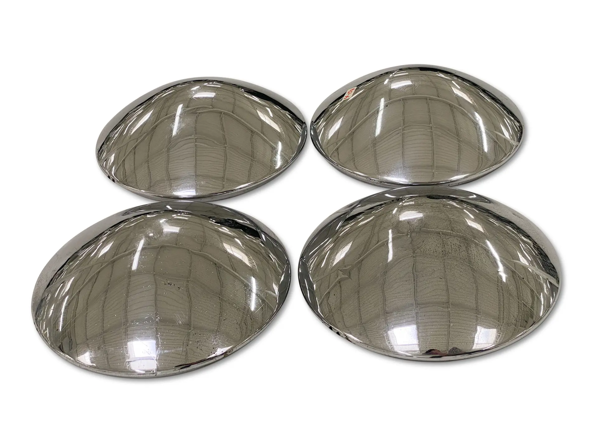 Four Chrome Hub Caps | The White Collection | Online | RM Sotheby's