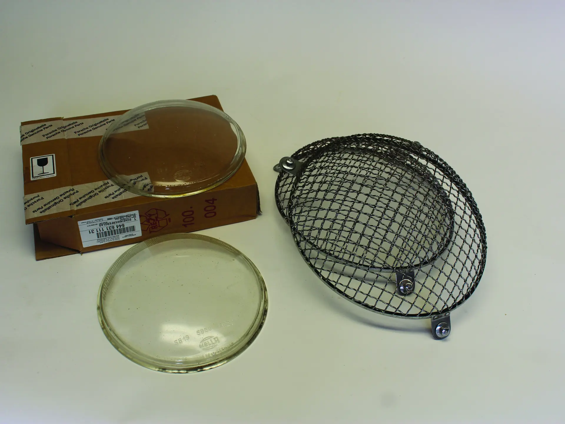 A pair of Hella headlight lenses together with a pair headlight stone ...