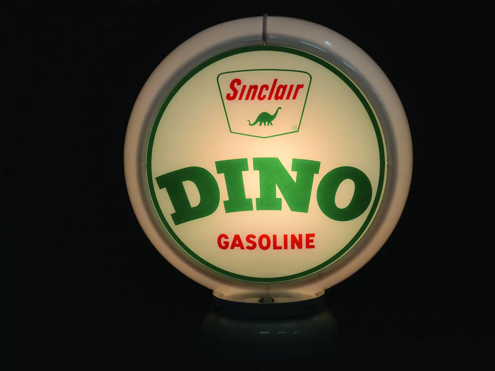 An original Sinclair Dino gas globe. | Auburn Fall 2016 | RM Sotheby's