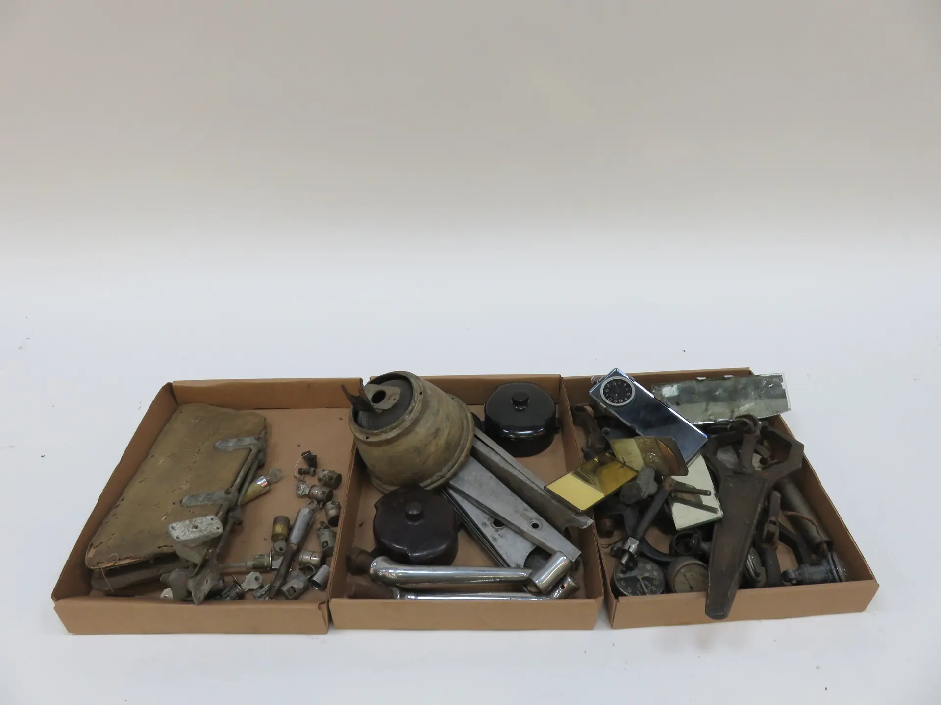 Shift knobs and an assorted group of antique automobile parts | Auburn ...