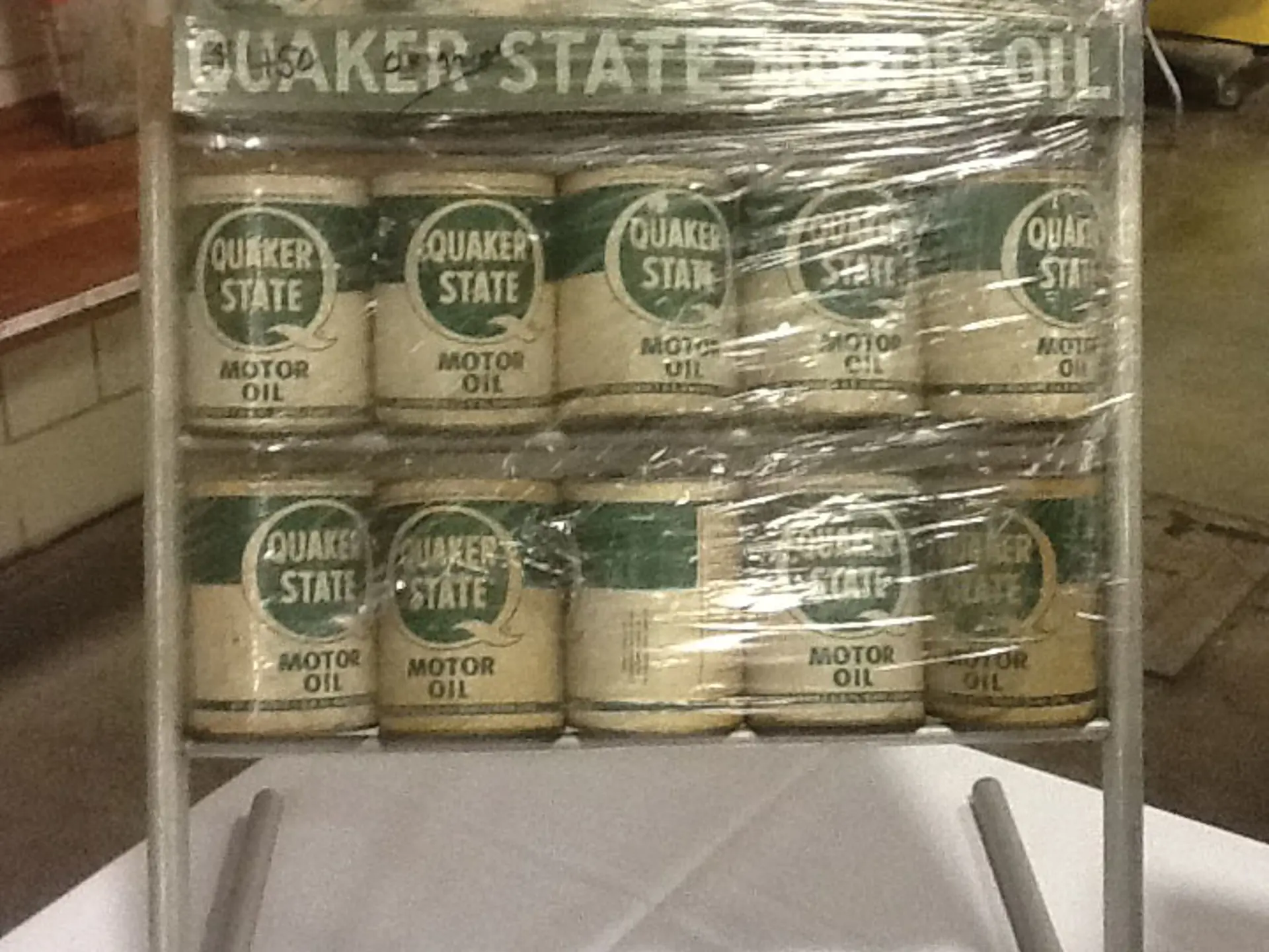 Quaker State Rack w/10 cans | Fort Lauderdale 2013 | RM Sotheby's
