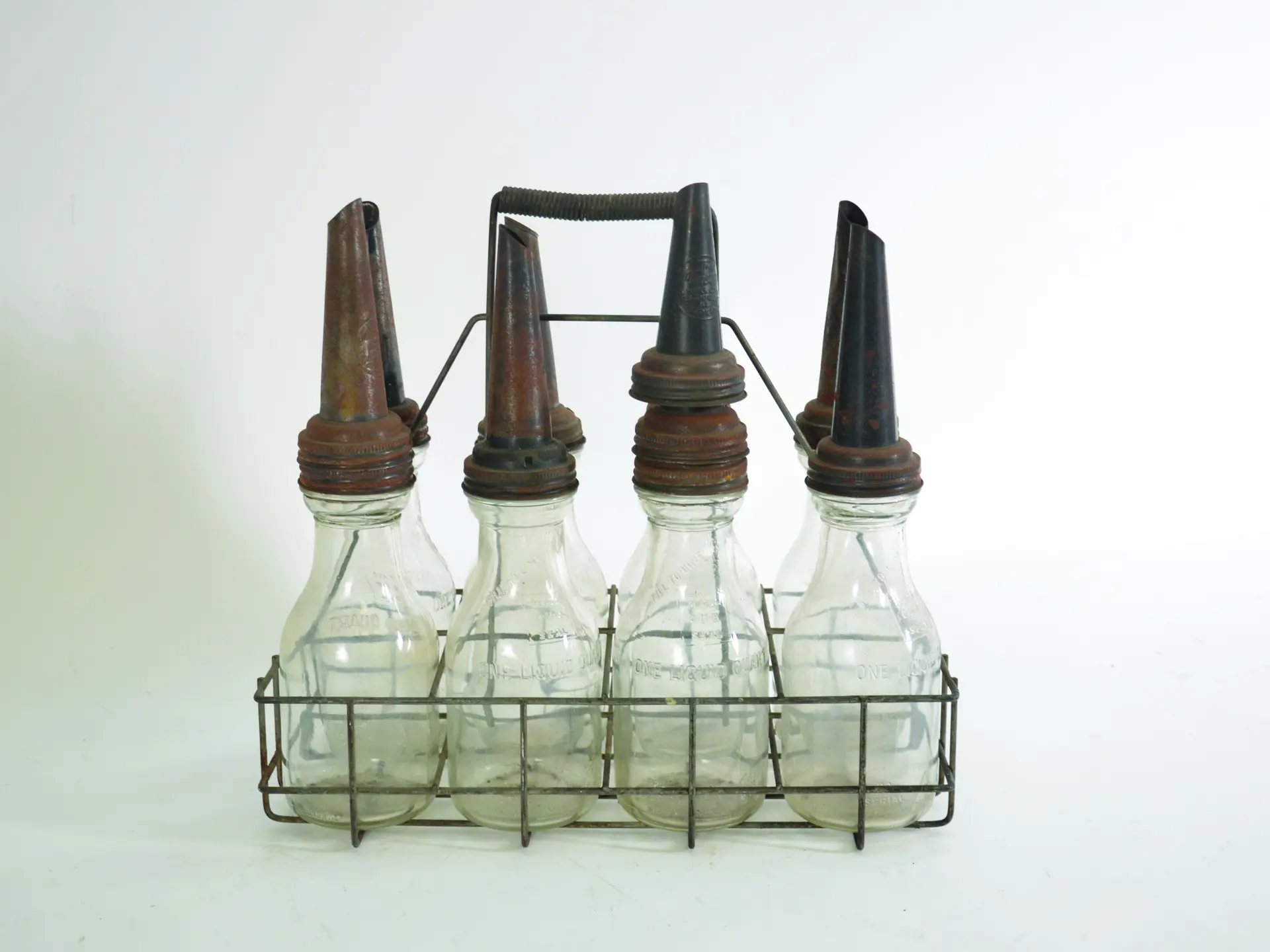 An eight pack glass oil bottle rack with bottles and toppers. | Auburn ...