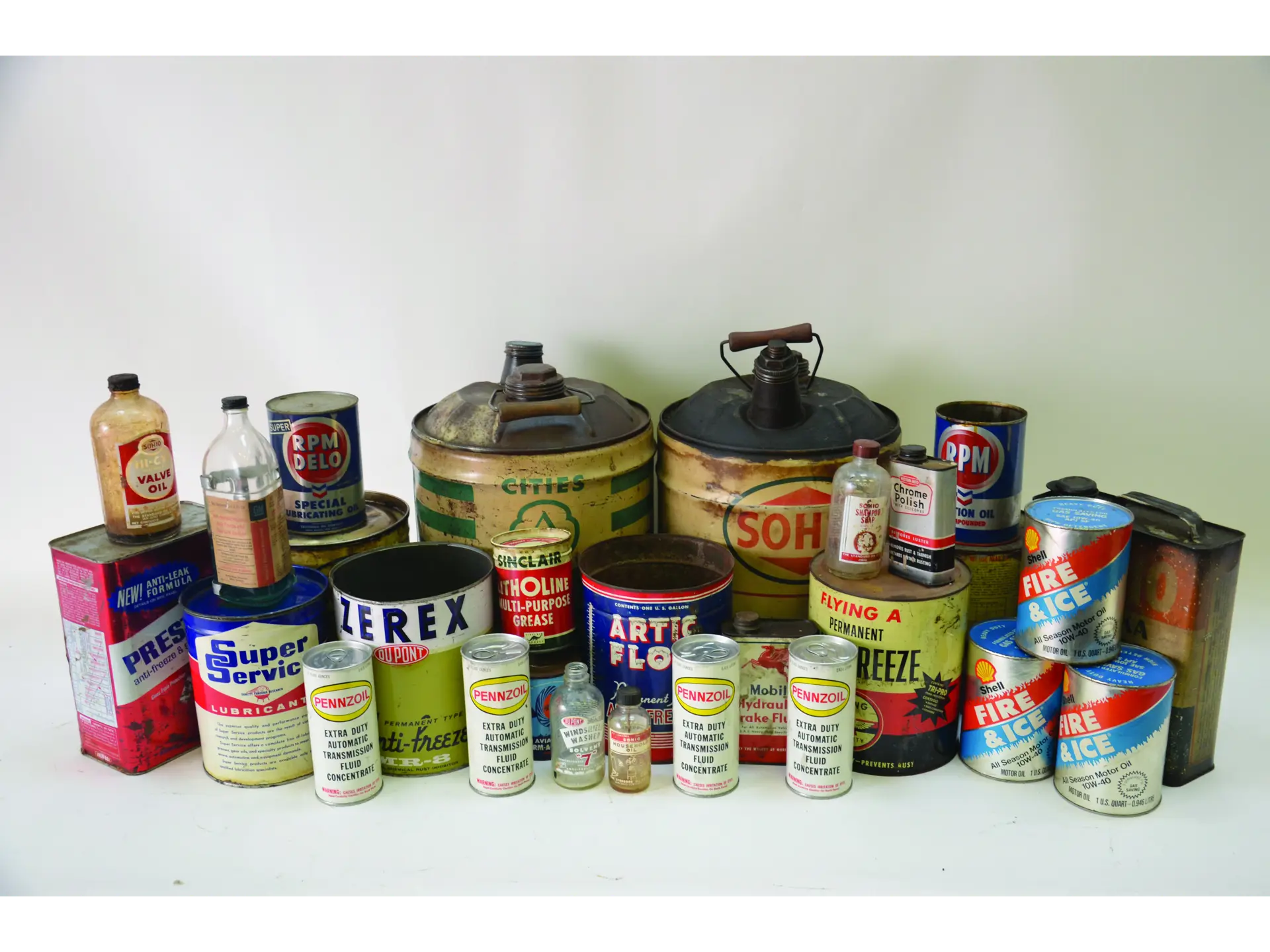 A large grouping of collectible oil cans. | Auburn Fall 2016 | RM Sotheby's