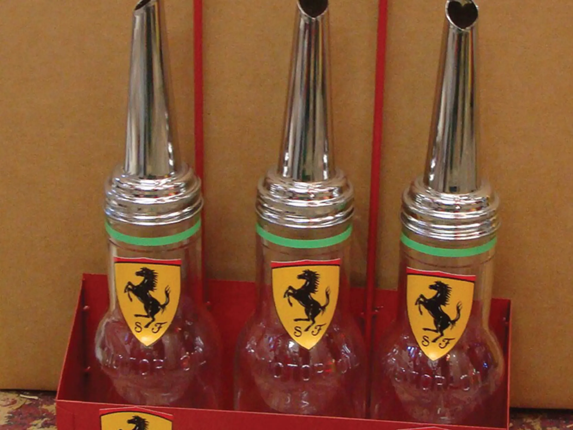 Rack of Oil Bottles done in Ferrari | Auburn Spring 2014 | RM Sotheby's