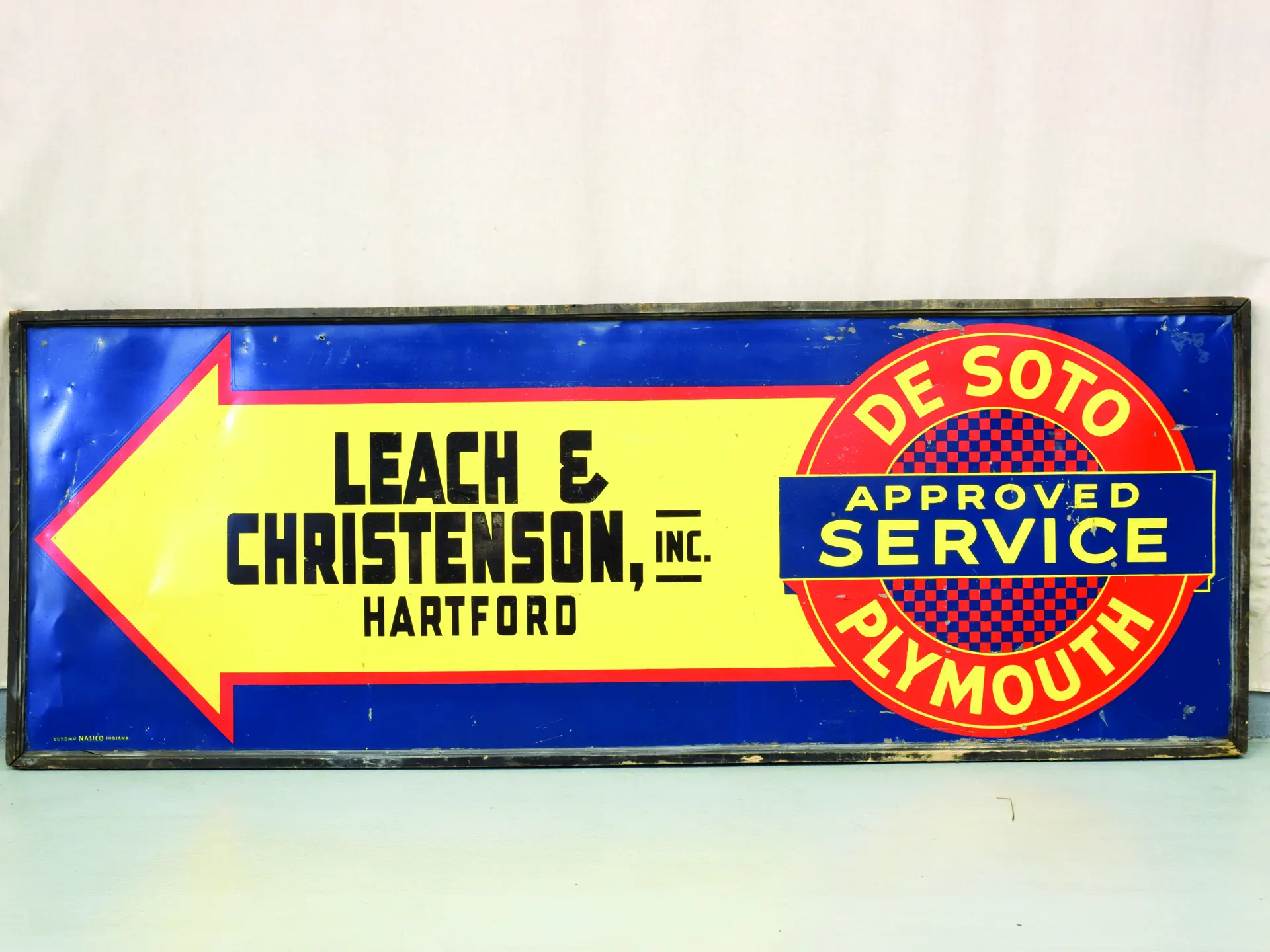 A single-sided, self-framed, tin painted, De Soto Plymouth Approved ...