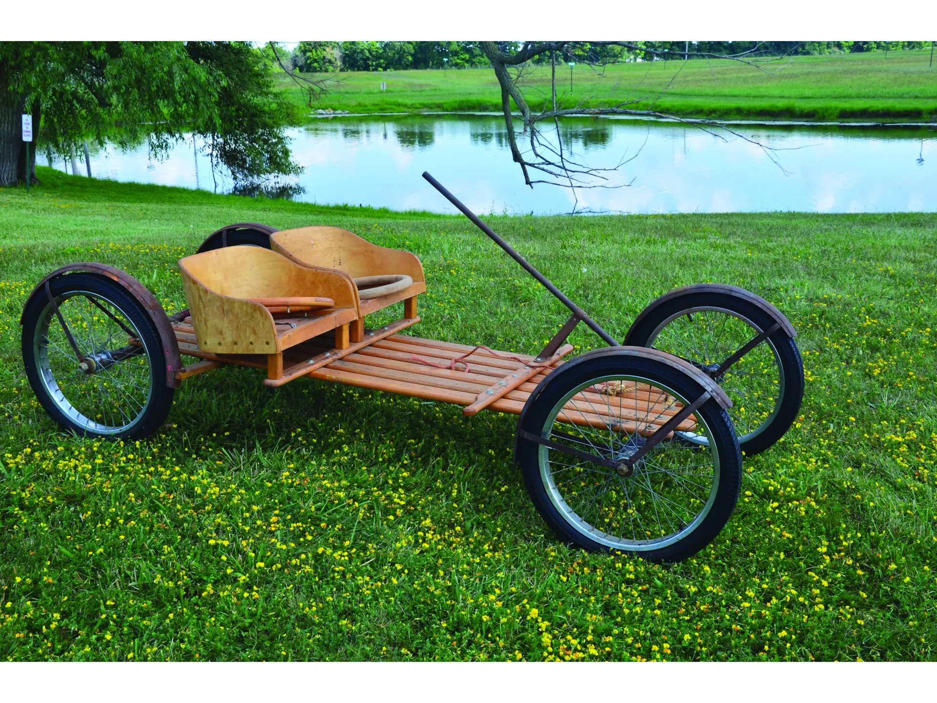 A wooden buckboard style car | Auburn Fall 2016 | RM Sotheby's