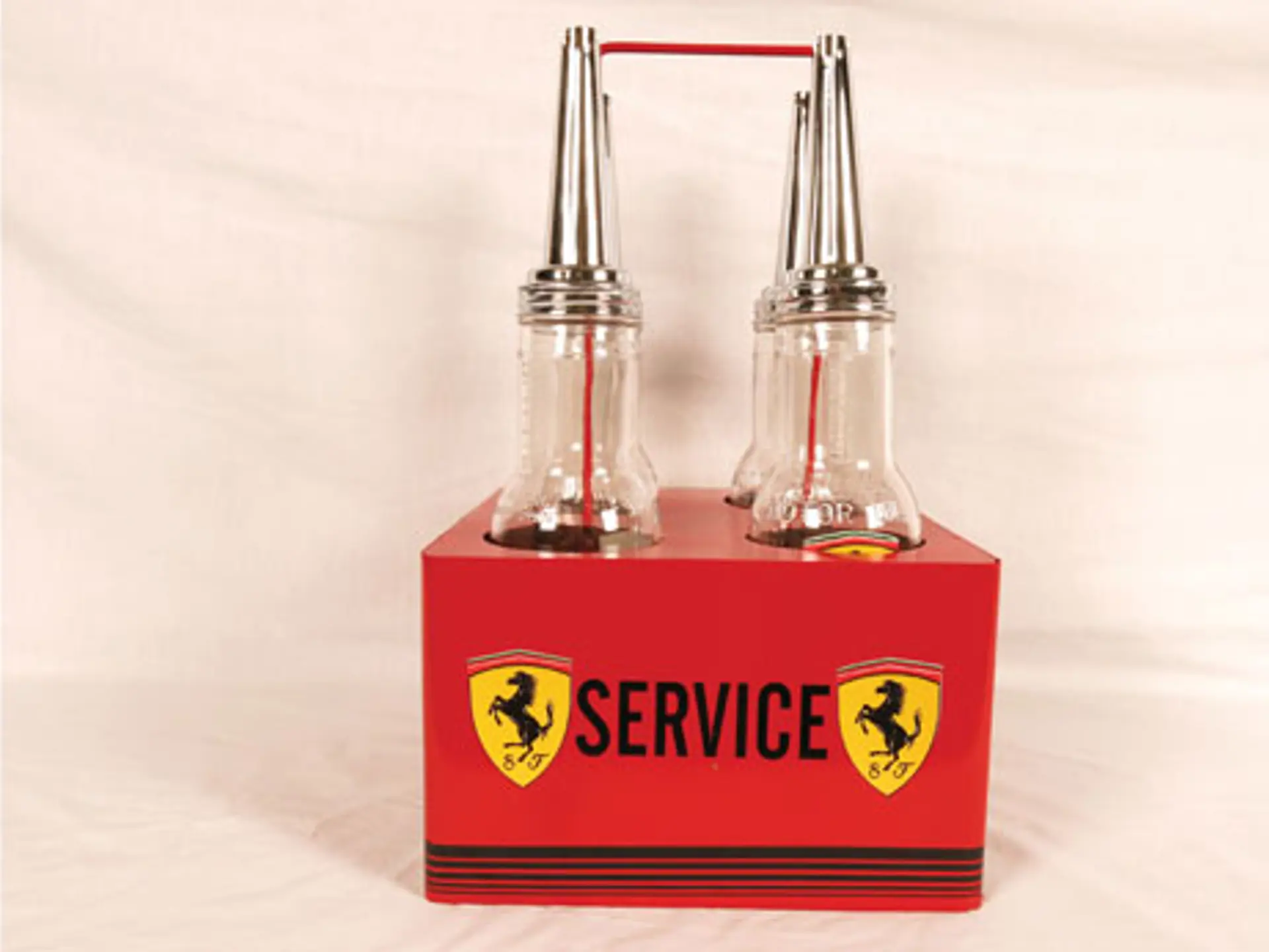Ferrari Service Oil Bottles Rack of Four | Auburn Fall 2013 | RM Sotheby's