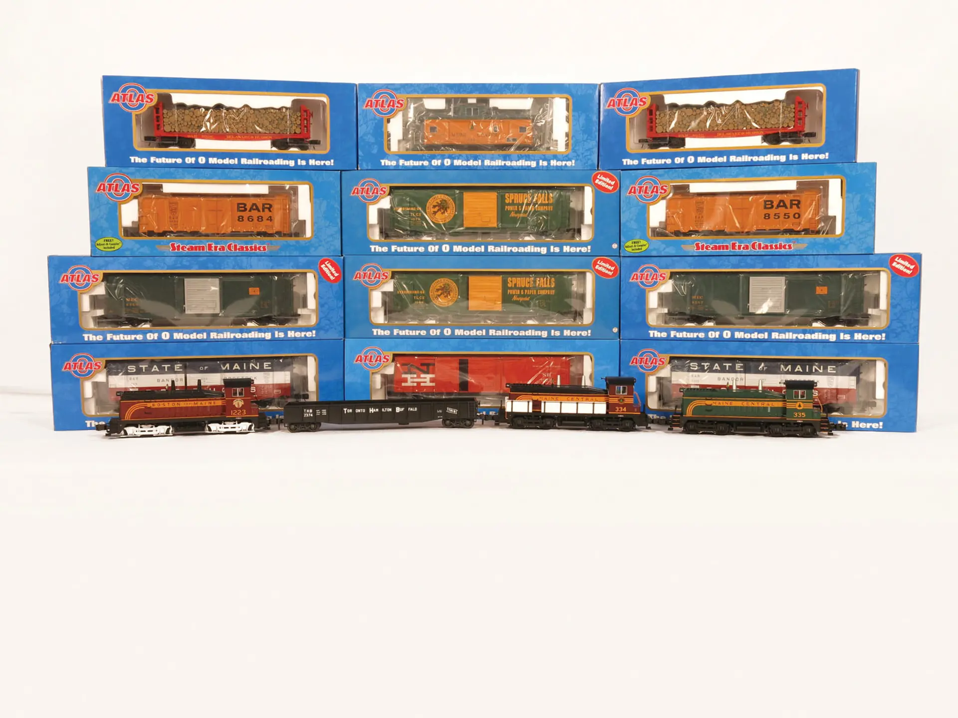 Three Atlas O Gauge SW9 Diesel Locomotives with Twelve Rolling Stock ...