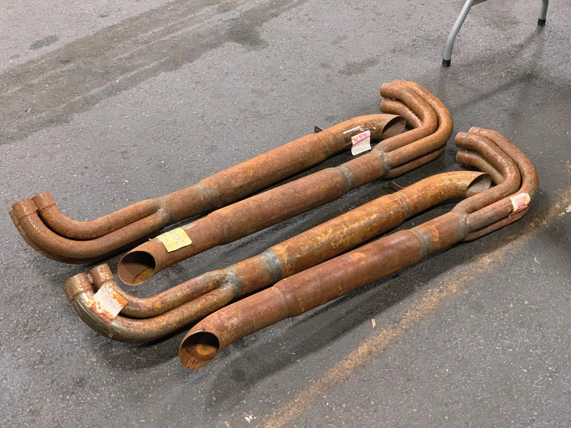 2 Sets of Side Pipes Labeled "427 Cobra" | Auburn Fall 2019 | RM Sotheby's