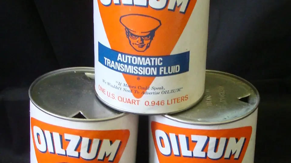 Oilzum 3 cans | Auburn Spring 2014 | RM Sotheby's