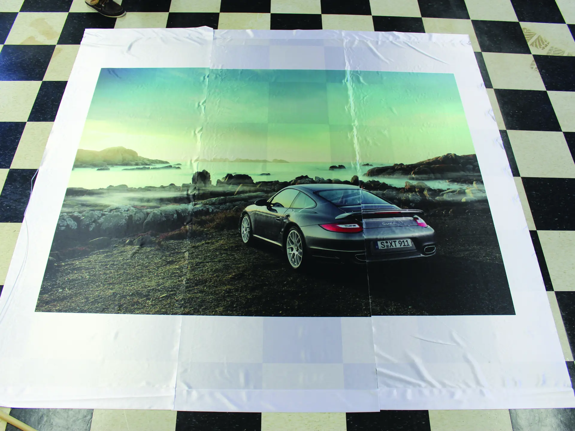 A large, satin, three-piece, Porsche factory wall hanging ...