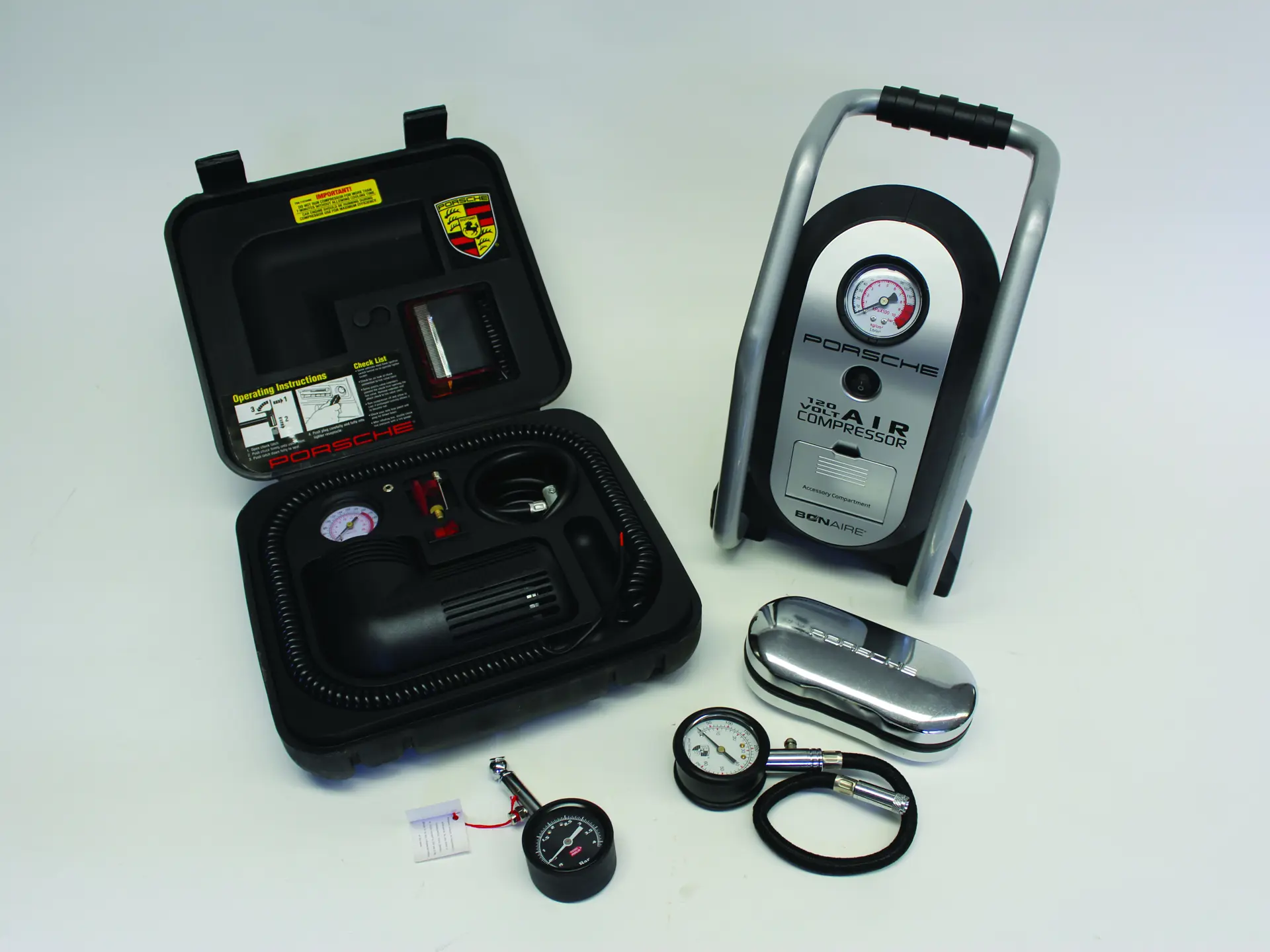 2 Porsche air compressors together with a Chopard Mille Miglia and ...