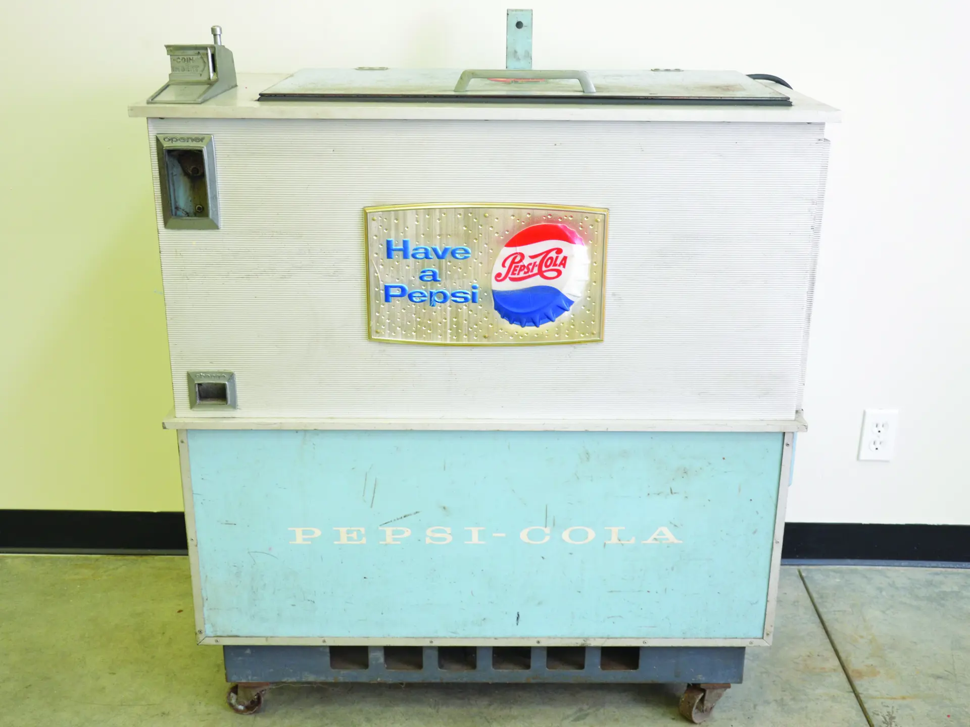 An Ideal Dispenser Co. model 855 Pepsi cooler, 38” height, 41” length ...