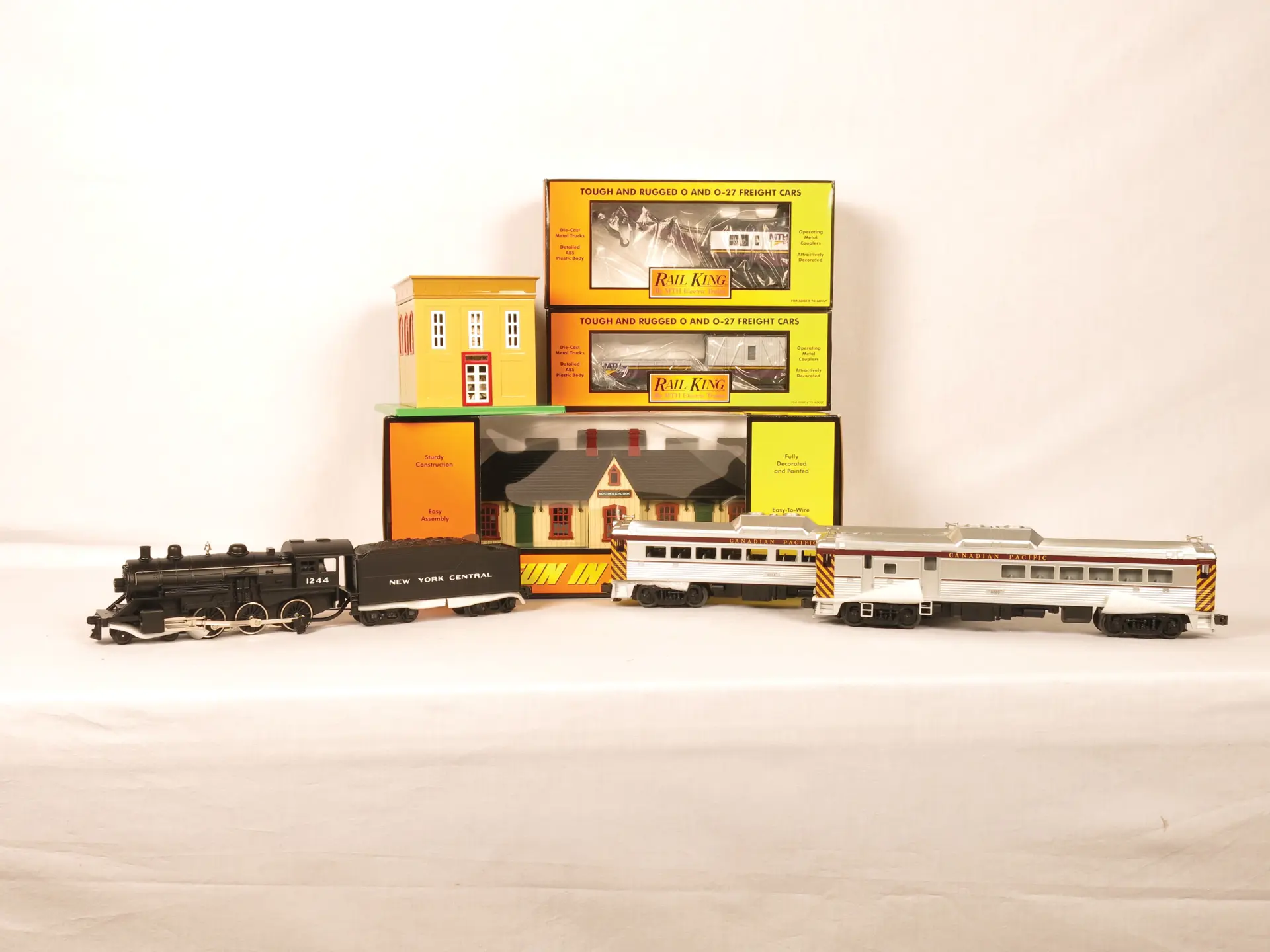 Assortment of O and O27 Gauge Rail King Steamer, RDC Budd Car set, Crane Tender and Car, plus ...