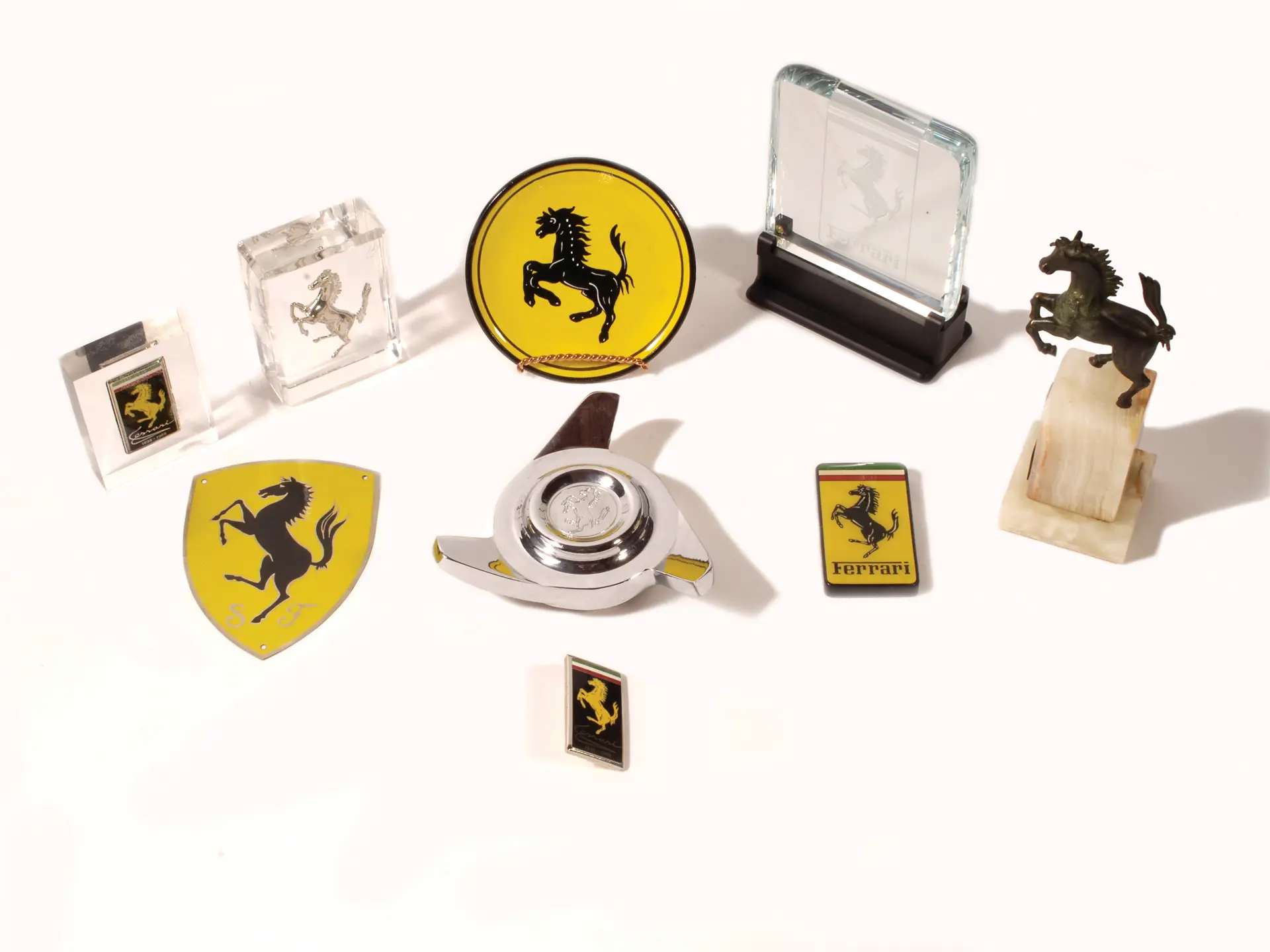 FERRARI DESK ACCESSORIES AND BADGES | The Ponder Collection | RM Sotheby's