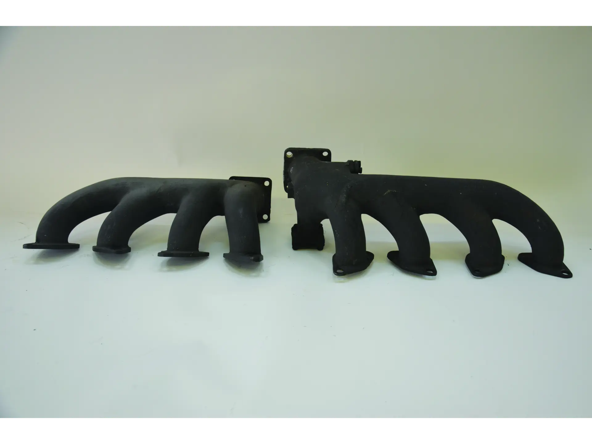 2 unpainted Duesenberg exhaust manifolds. | Auburn Fall 2016 | RM Sotheby's