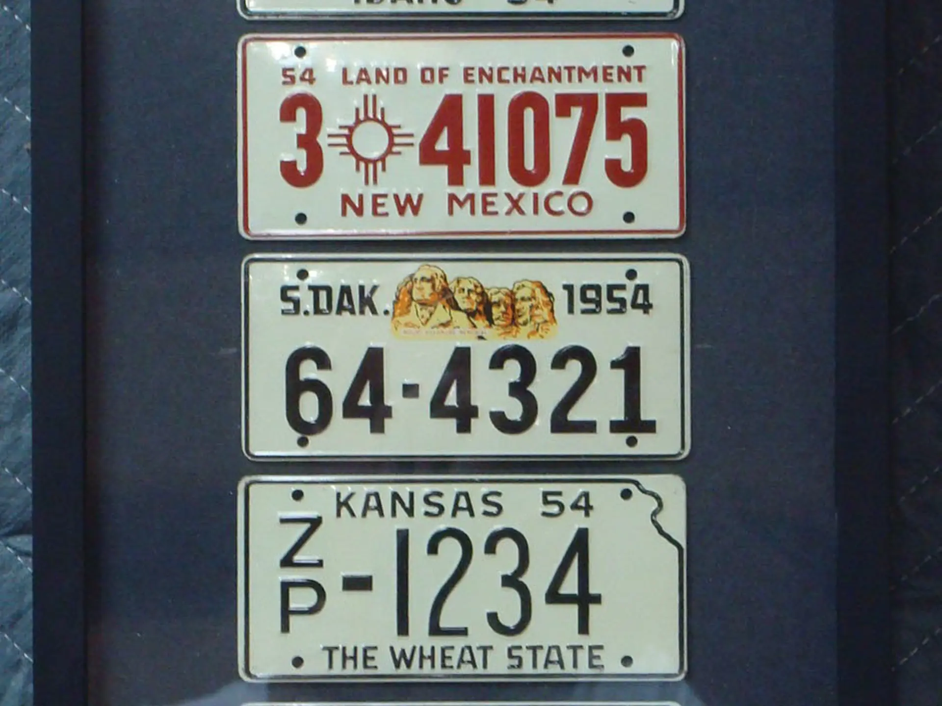 Framed Assortment of 1954 Miniature License Plates Idaho, New Mexico ...