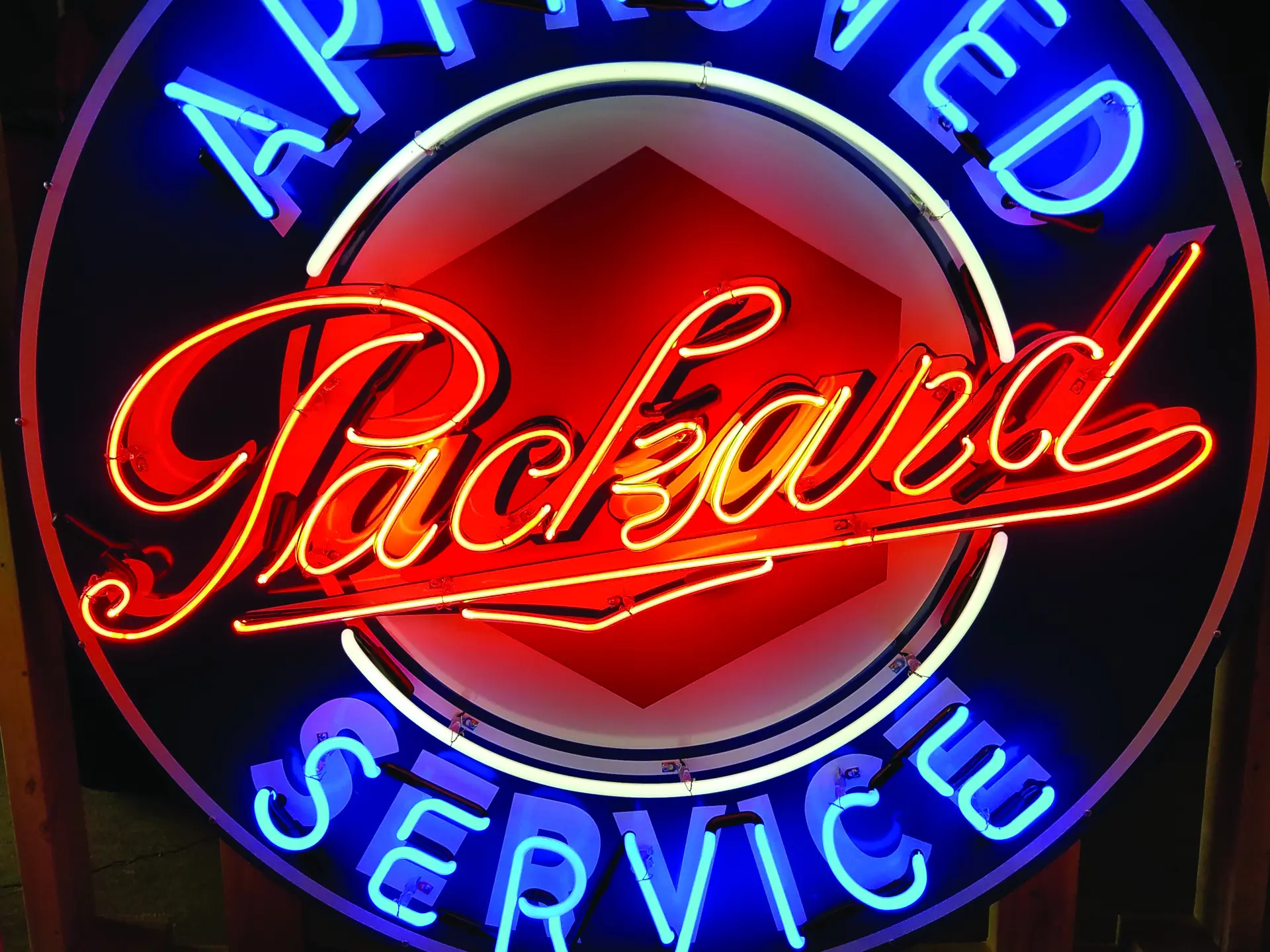 A custom, Packard, tin, neon, sign. | Auburn Spring 2017 | RM Sotheby's