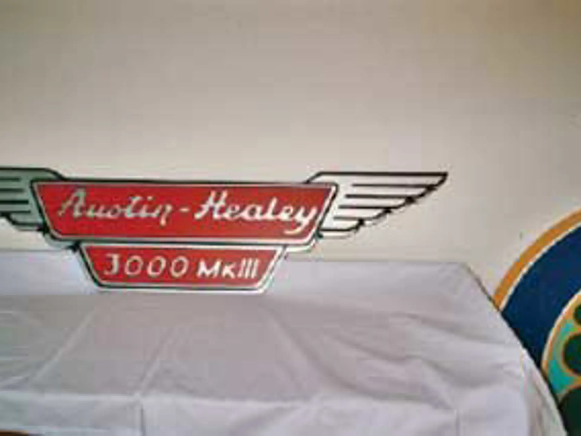 Austin Healey Dealership sign. | The Florida Collector Car Auction 2004 ...