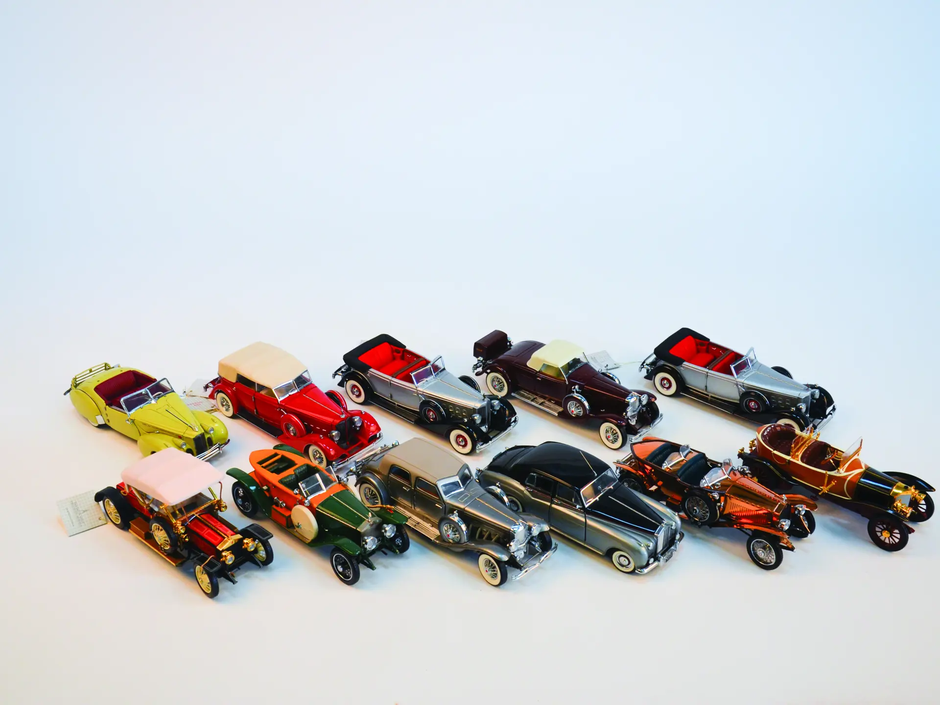 A grouping of 11, high-end marque, Franklin mint, 1/24 scale model cars ...