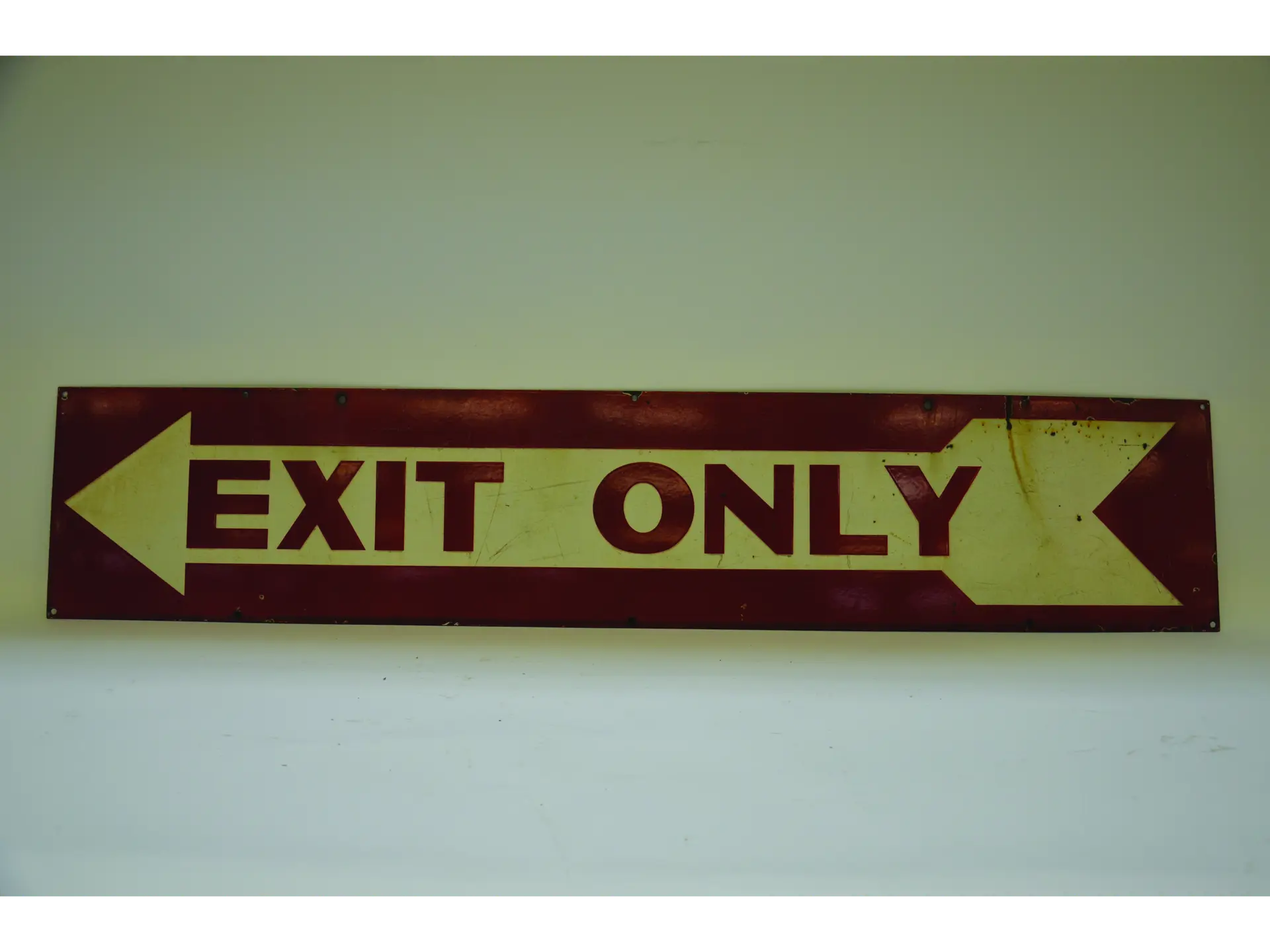 A single-sided, porcelain exit only arrow sign, 60" x 12." | Auburn ...