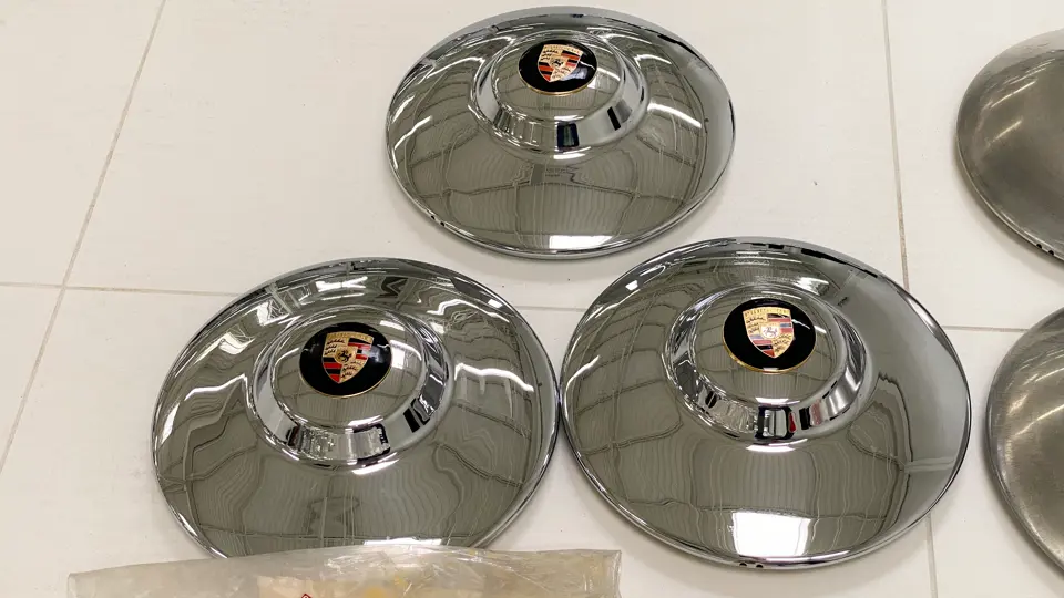 Seven Porsche Hub Caps | The White Collection | Online | RM Sotheby's
