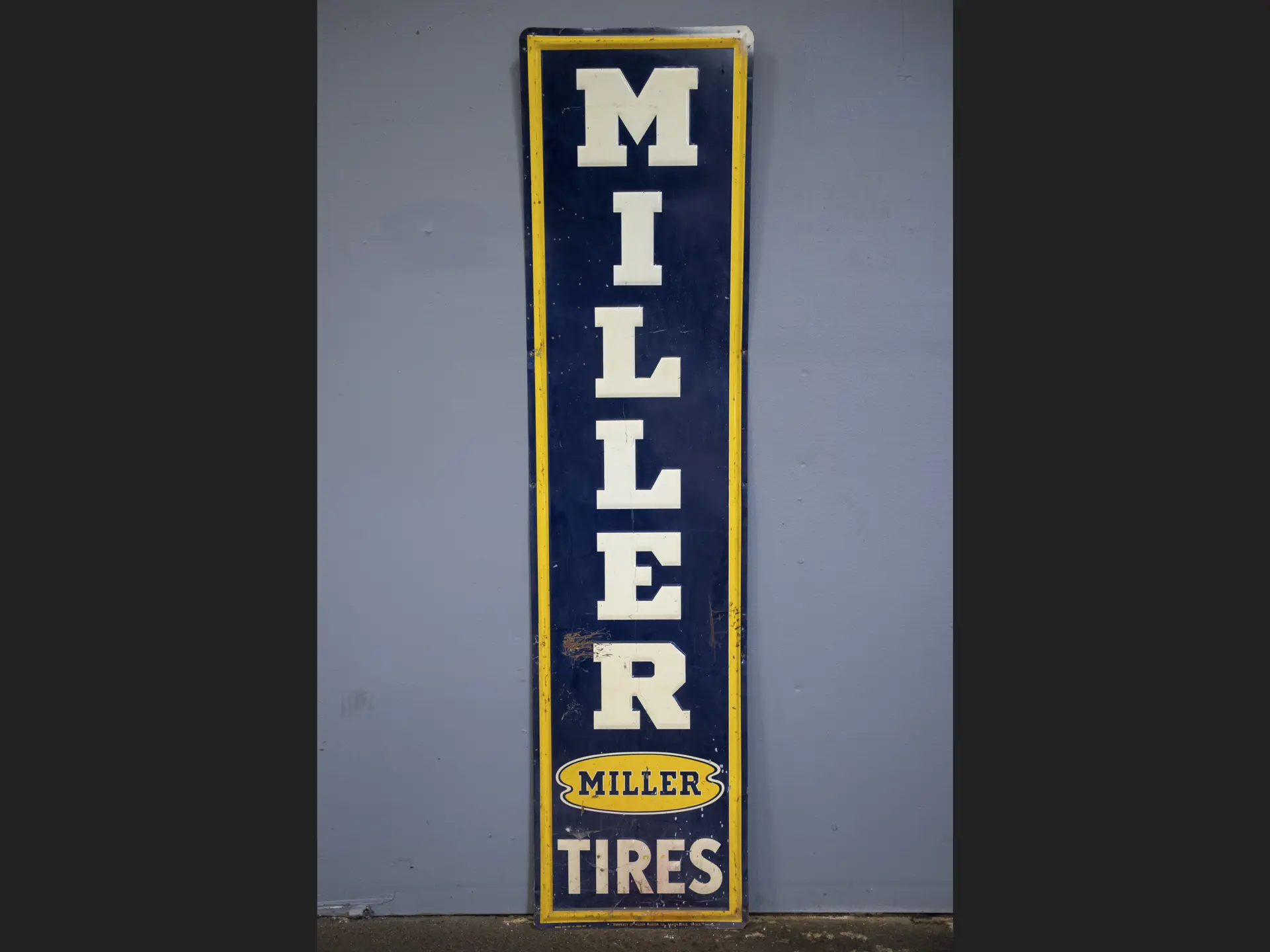 Miller Tires Vertical Tin Sign | Auburn Fall 2021 | RM Sotheby's