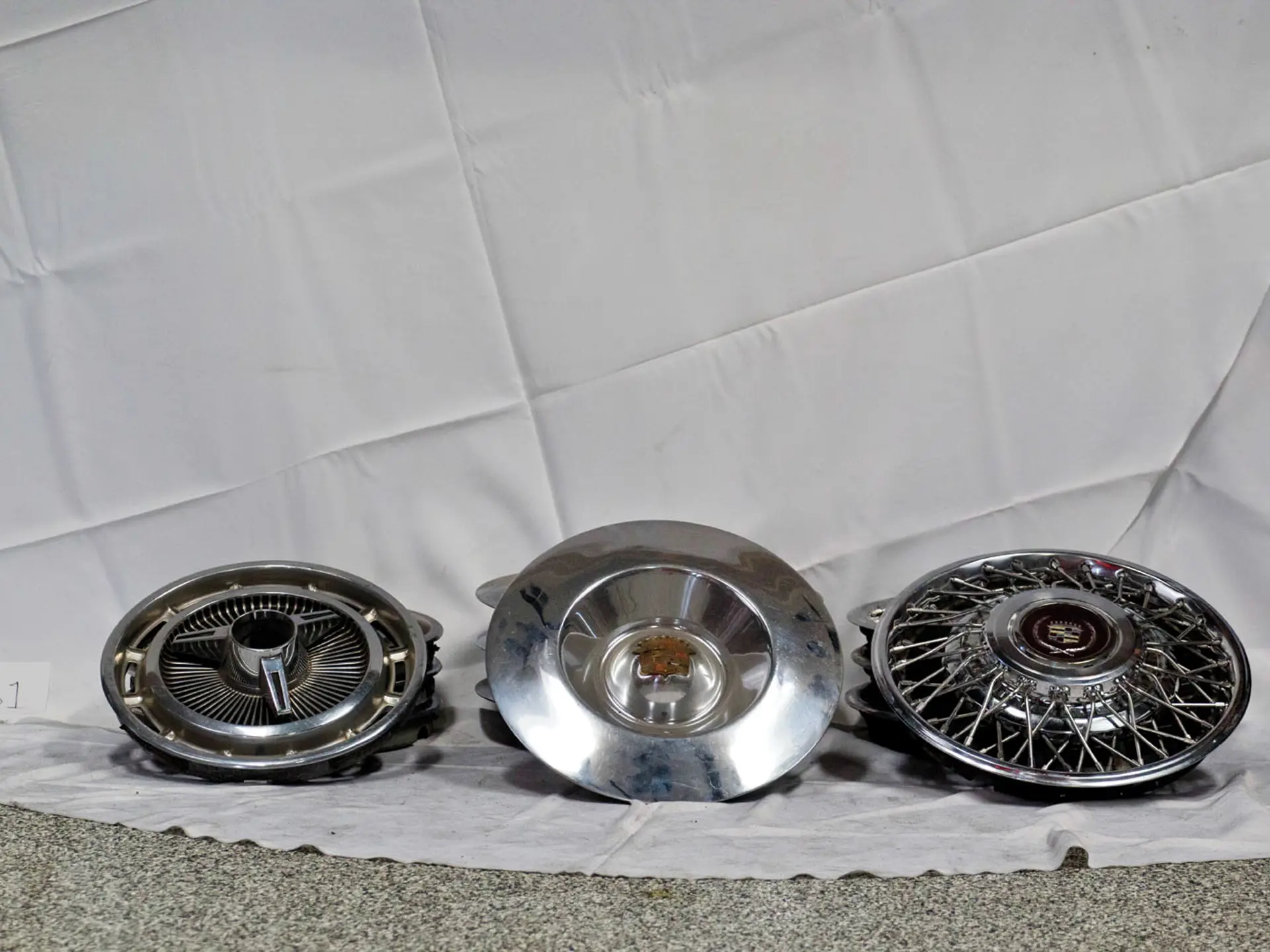 Three sets of Hubcaps | Fort Lauderdale 2014 | RM Sotheby's