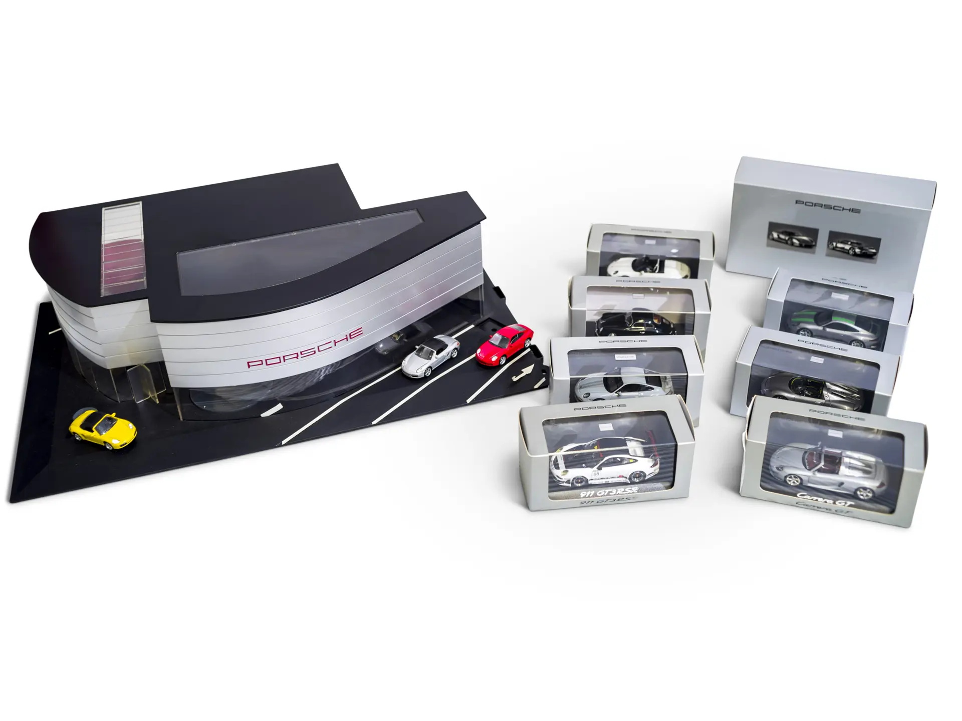 Porsche Design Driver's Selection Zentrum Display with 1:43 Scale Models | The White Collection ...